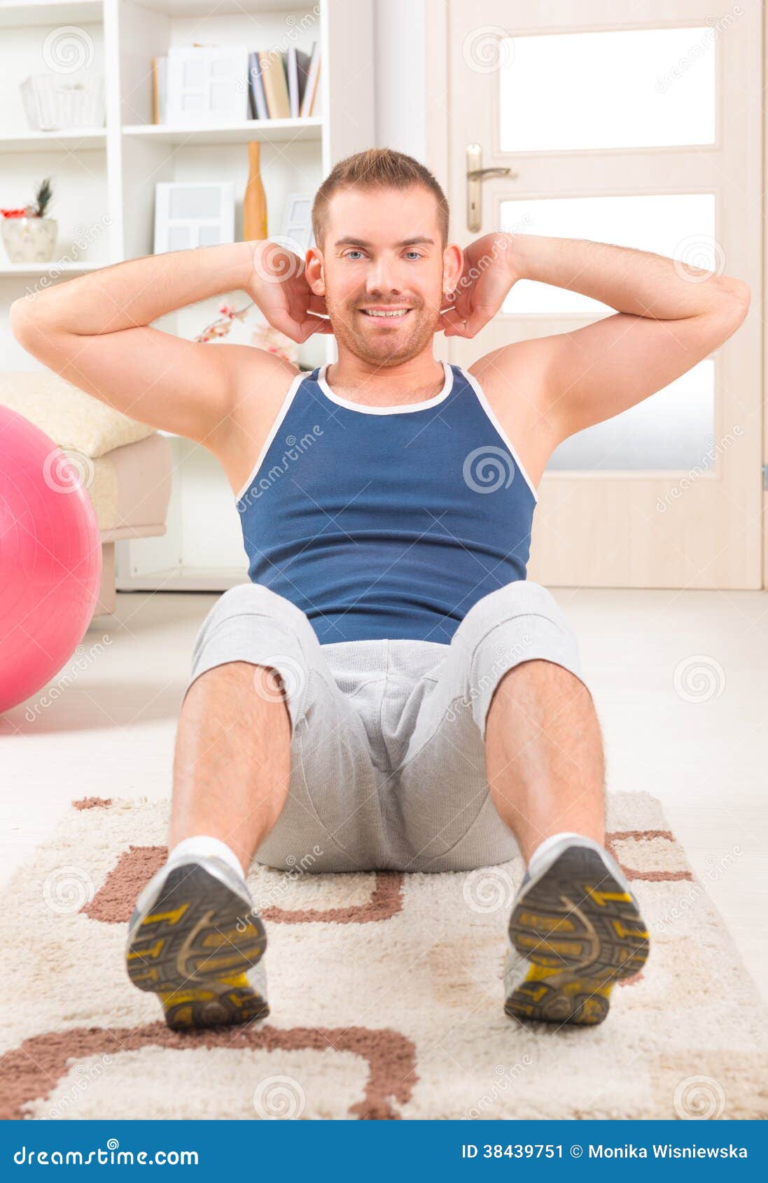 Handsome man doing sit ups stock image. Image of energy - 38439751