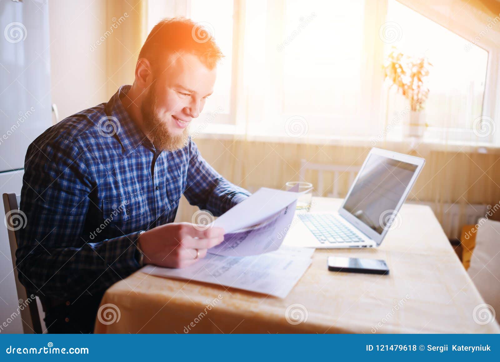 Handsome Man Doing Some Paperwork at Home Stock Photo - Image of ...