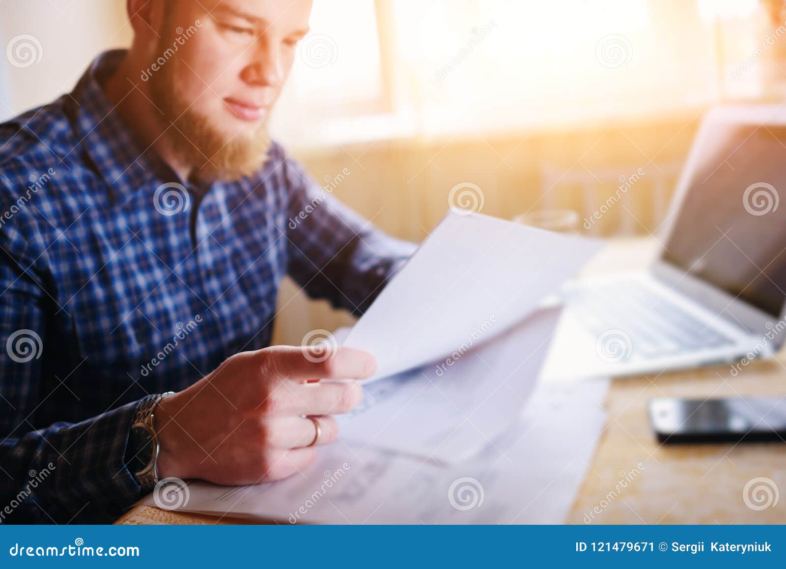 Handsome Man Doing Some Paperwork at Home Stock Image - Image of ...