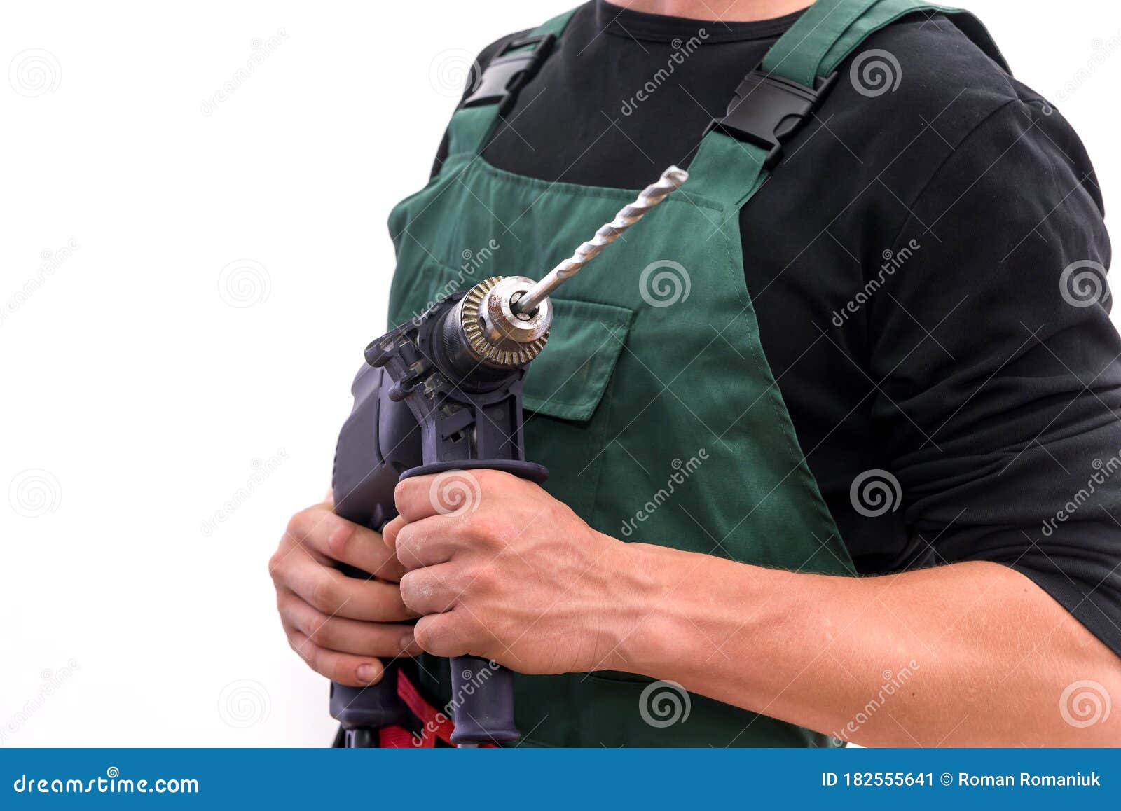 Handsome Man with Drill Machine Posing Isolated on White. Worker in ...