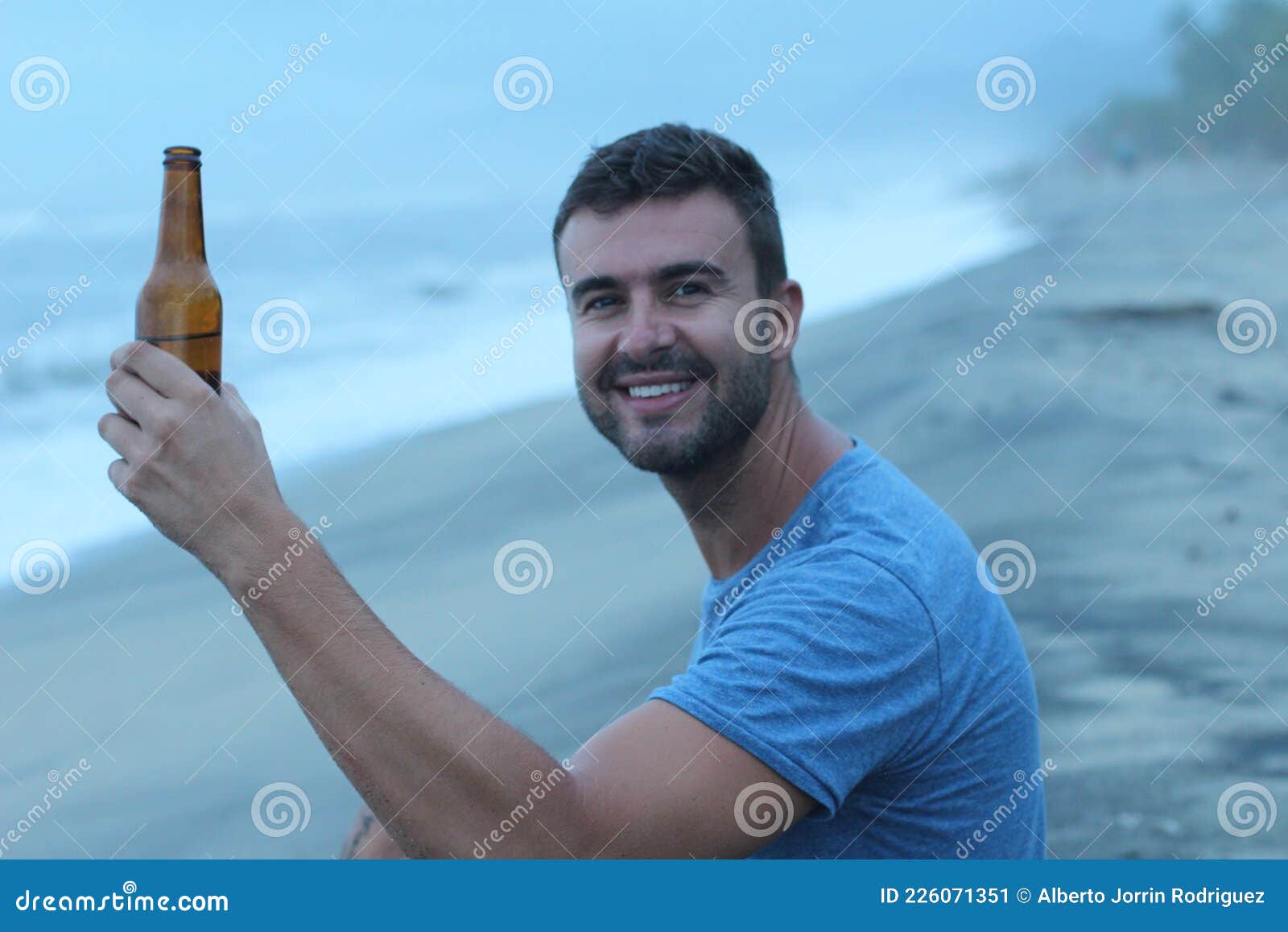 Handsome Man Drinking a Beer in Tropical Beach Stock Image - Image of ...