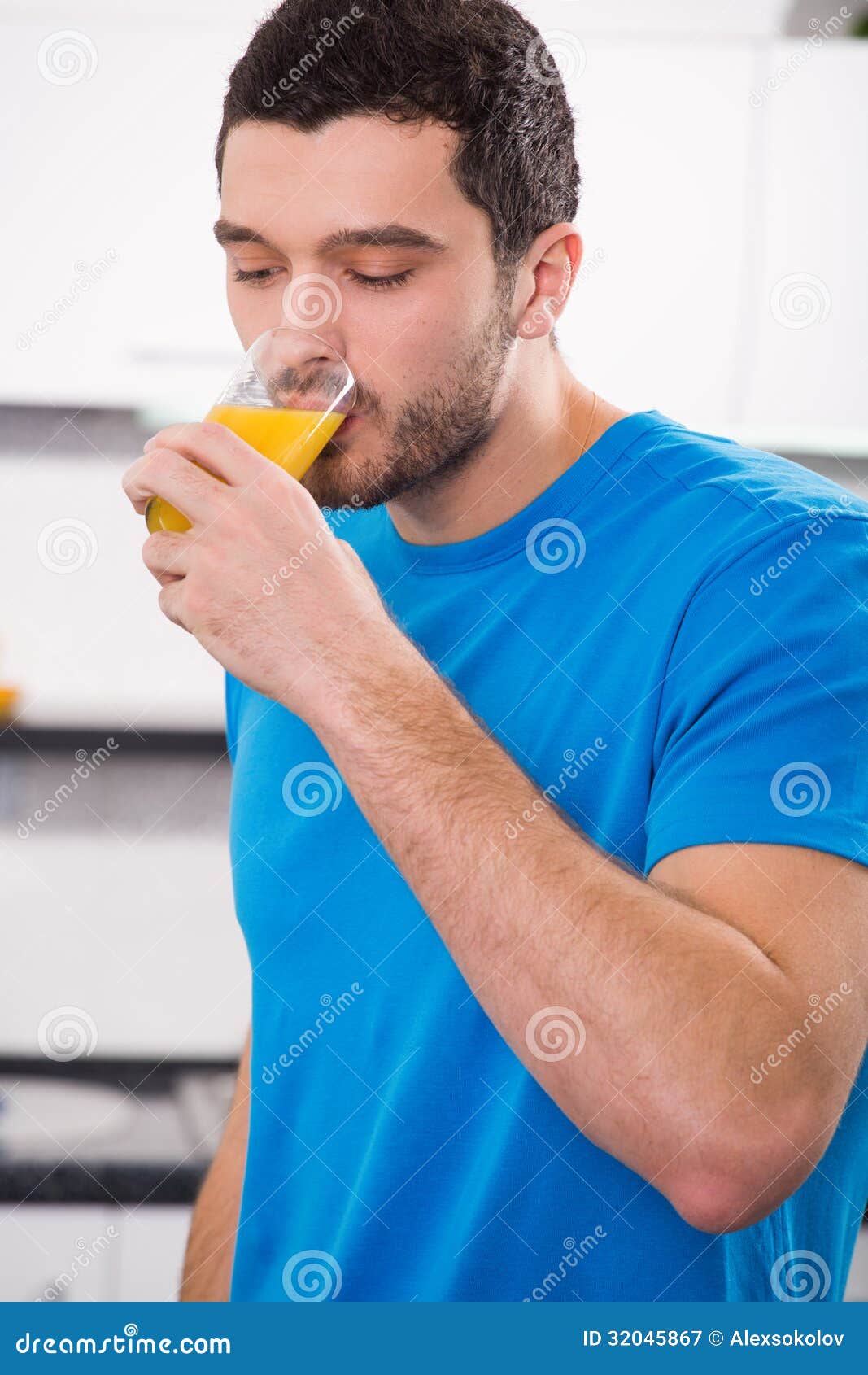 Handsome Man Drinking Orange Juice Stock Image - Image of alone ...