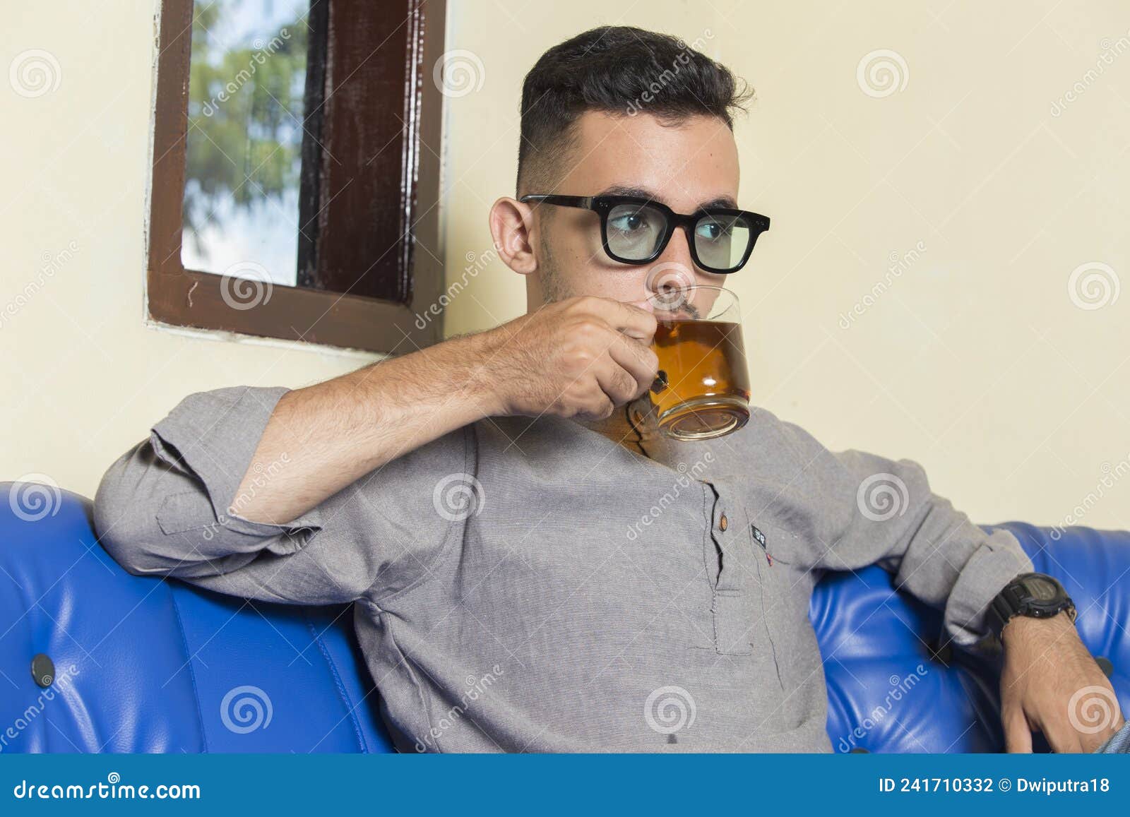 Handsome Man Drinking a Tea in His Room Stock Photo - Image of ...
