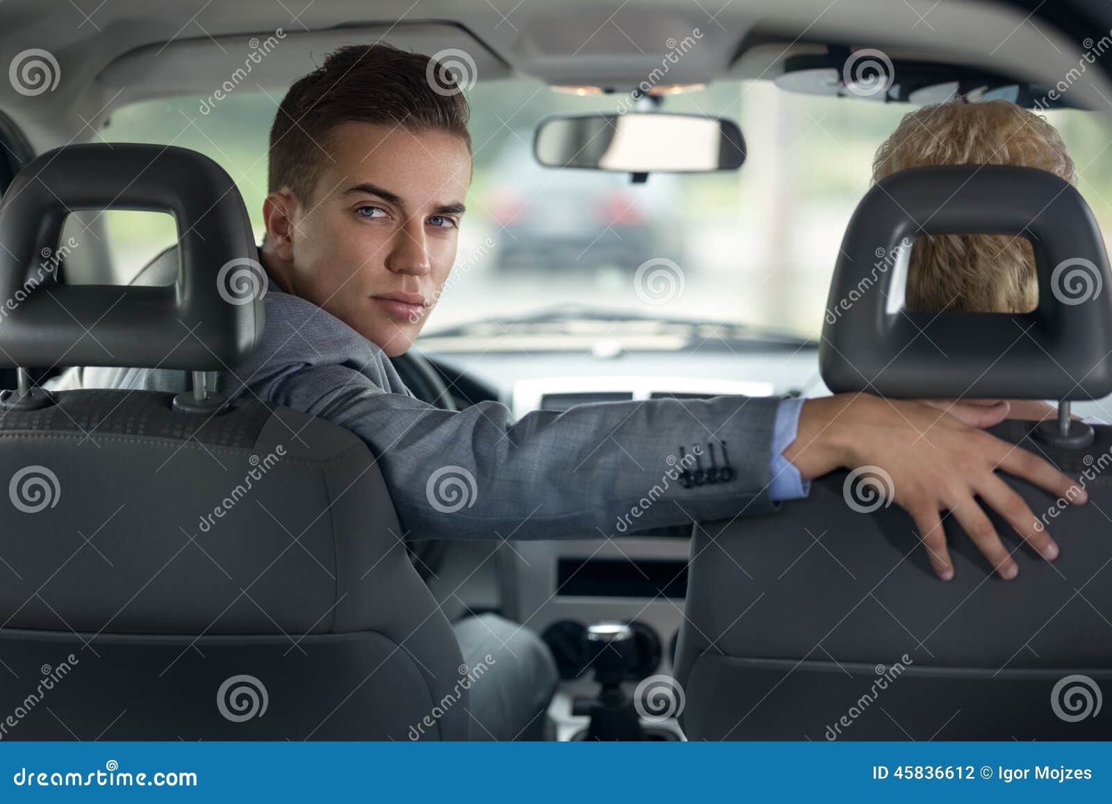 Handsome Man Driver Looking Back Stock Photo - Image of people ...