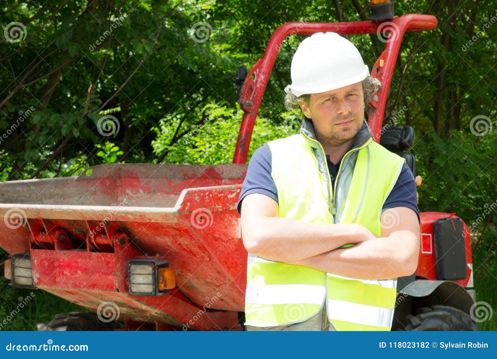 Handsome Man Driver Standing in Front of Construction Machinery on ...