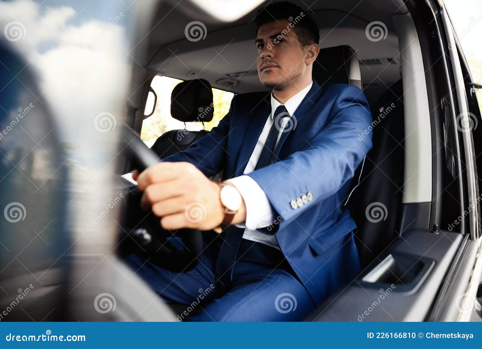 Handsome Man Driving His Luxury Car Stock Photo - Image of adult ...