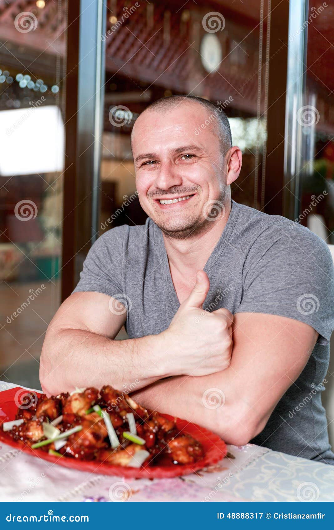 Handsome man eating stock image. Image of smile, hungry - 48888317