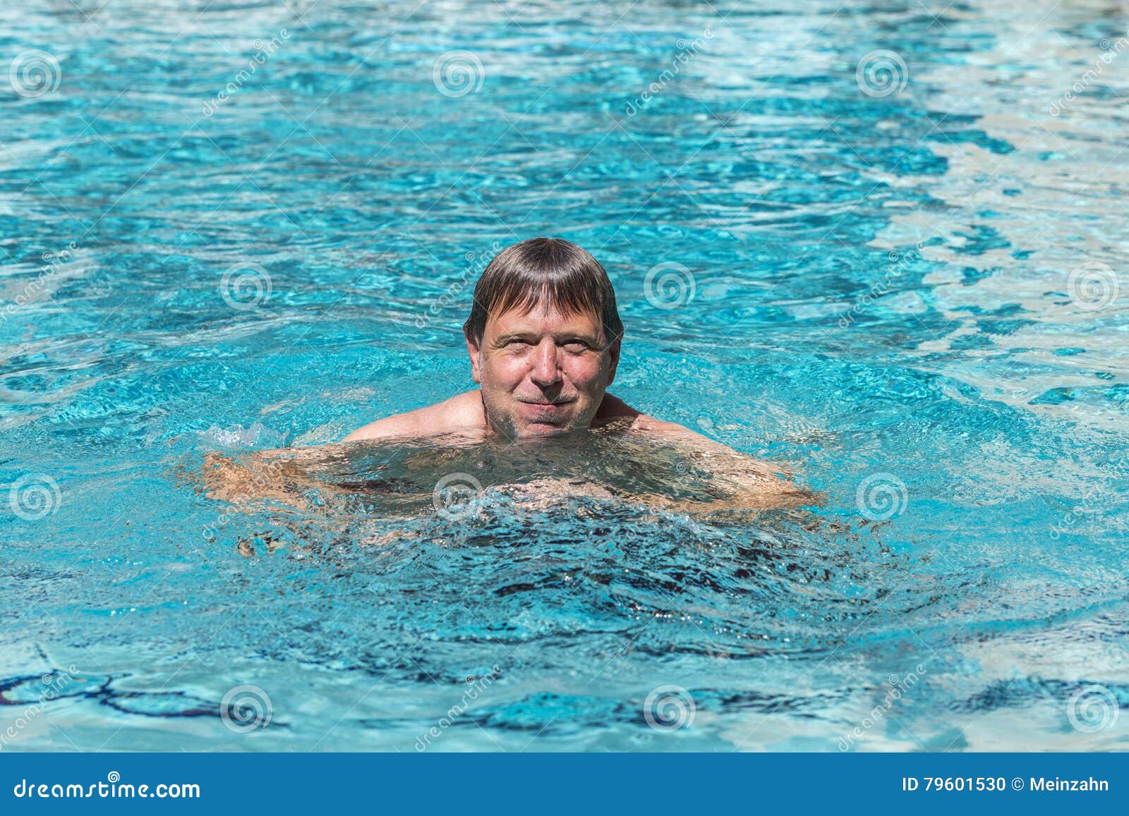 Handsome Man Enjoys Swimming in the Pool Stock Photo - Image of ...