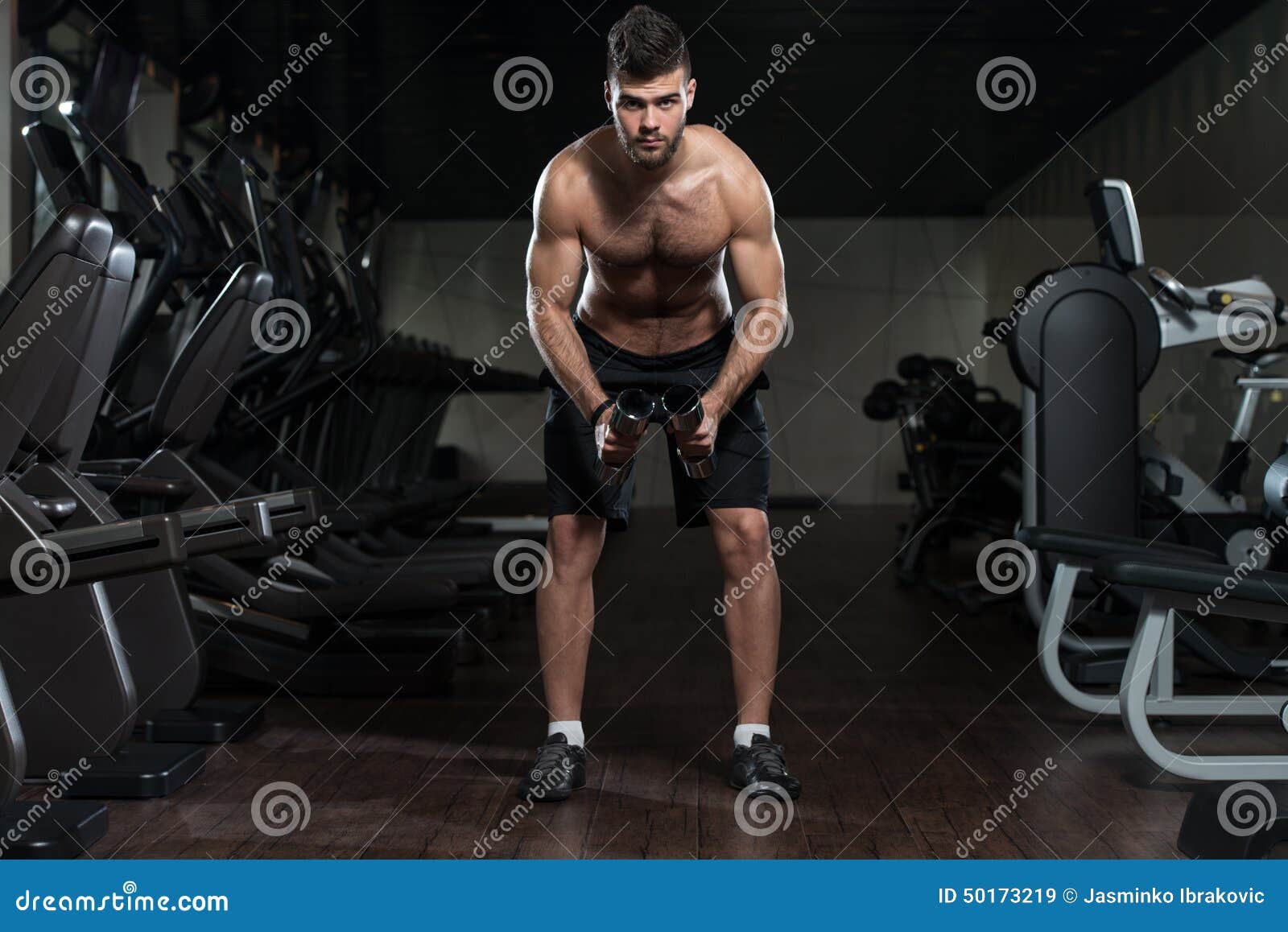 Handsome Man Exercising Shoulder with Dumbbells Stock Image - Image of ...
