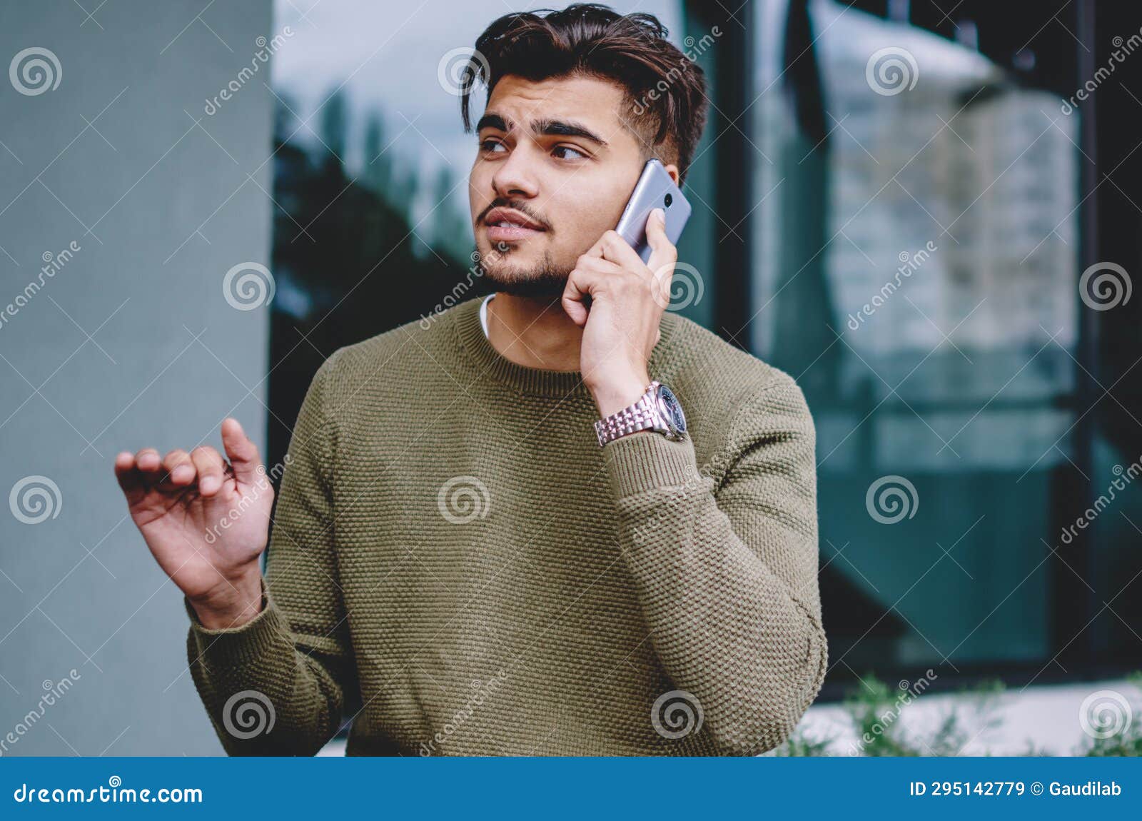 Handsome Man Explaining Information during Telephone Conversation ...