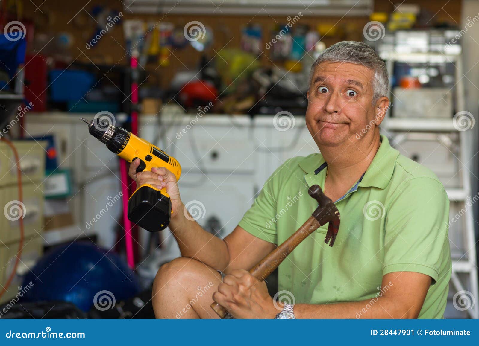 Handsome man in garage stock image. Image of male, hammer - 28447901