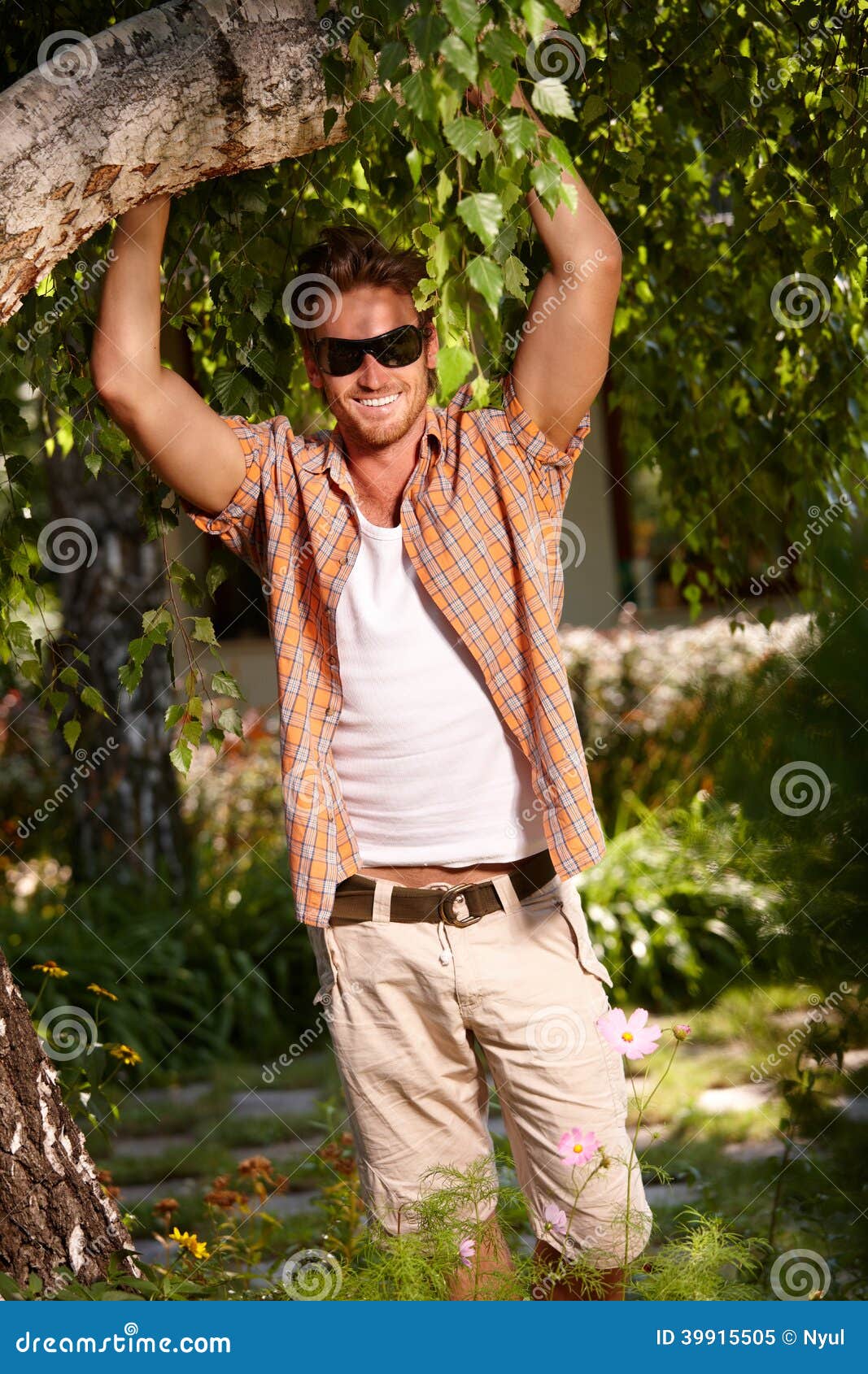 Handsome Man in the Garden Smiling Stock Image - Image of alone, garden ...