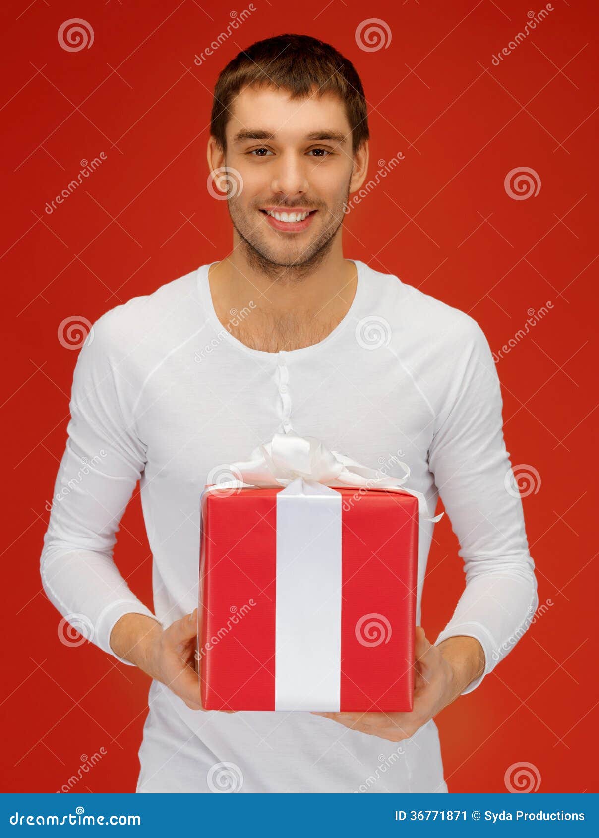 Handsome man with a gift stock image. Image of dude, season - 36771871
