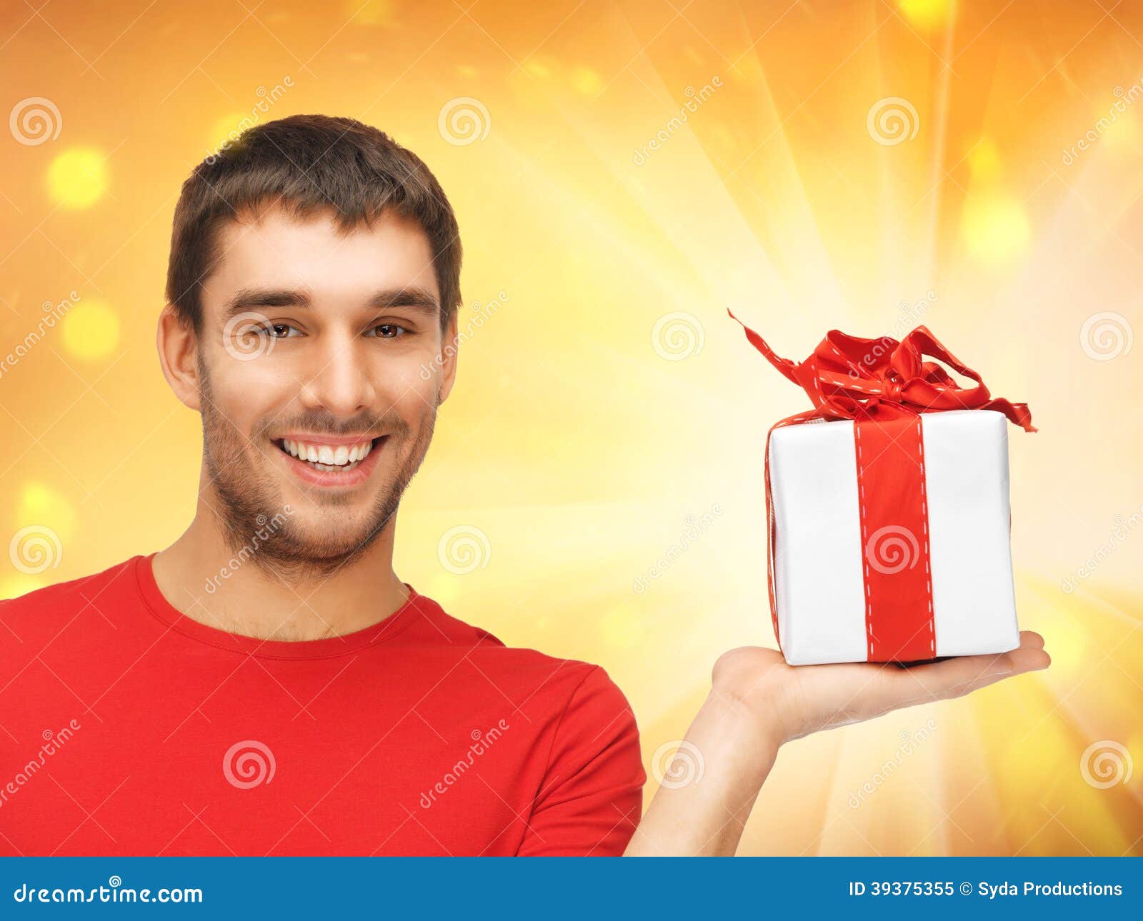 Handsome man with a gift stock image. Image of celebration - 39375355