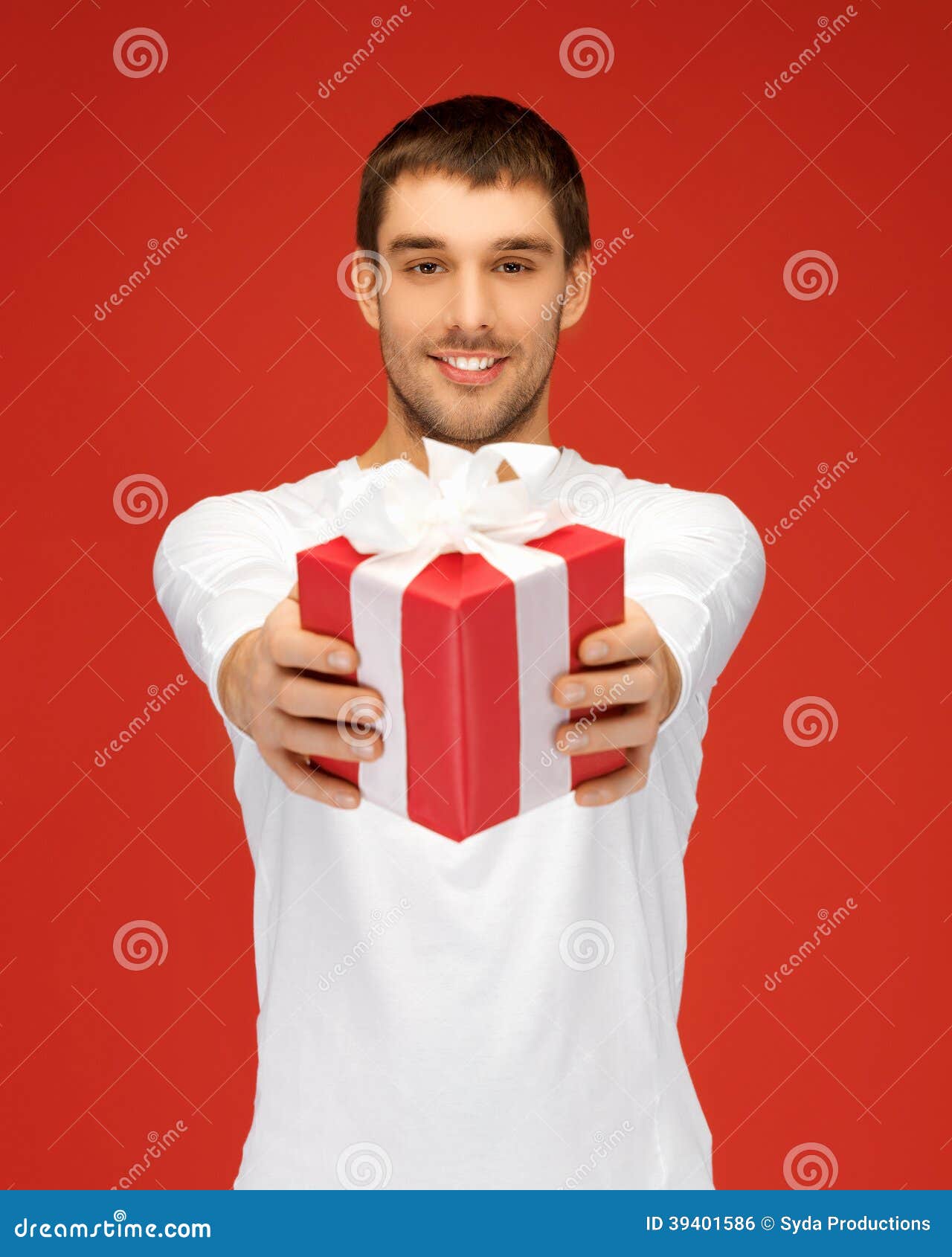 Handsome man with a gift stock photo. Image of male, package - 39401586