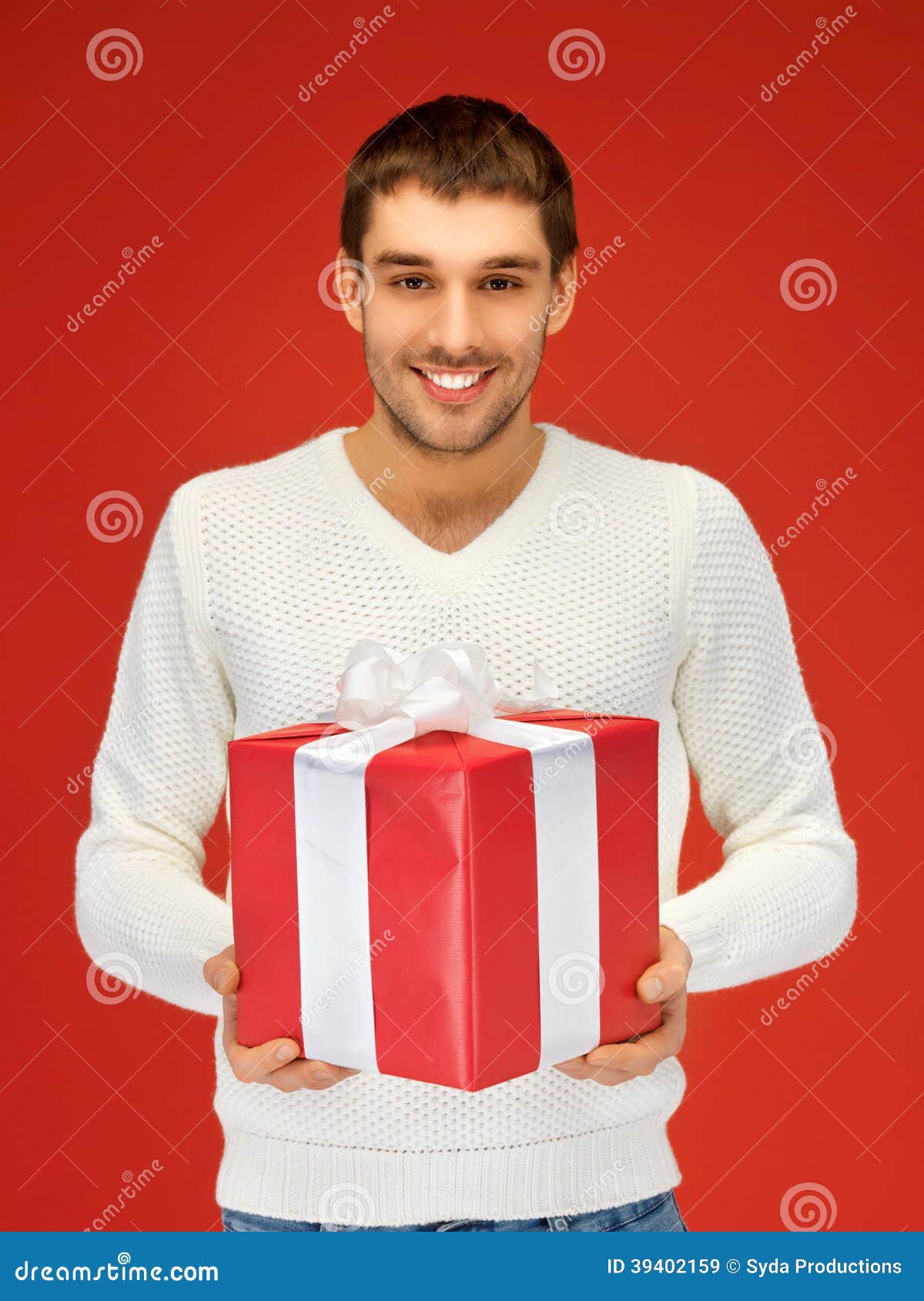 Handsome man with a gift stock image. Image of present - 39402159