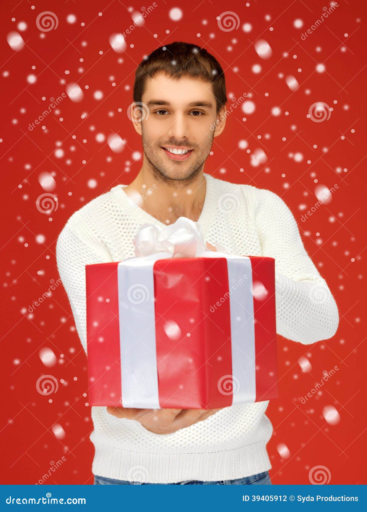 Handsome man with a gift stock photo. Image of holiday - 39405912