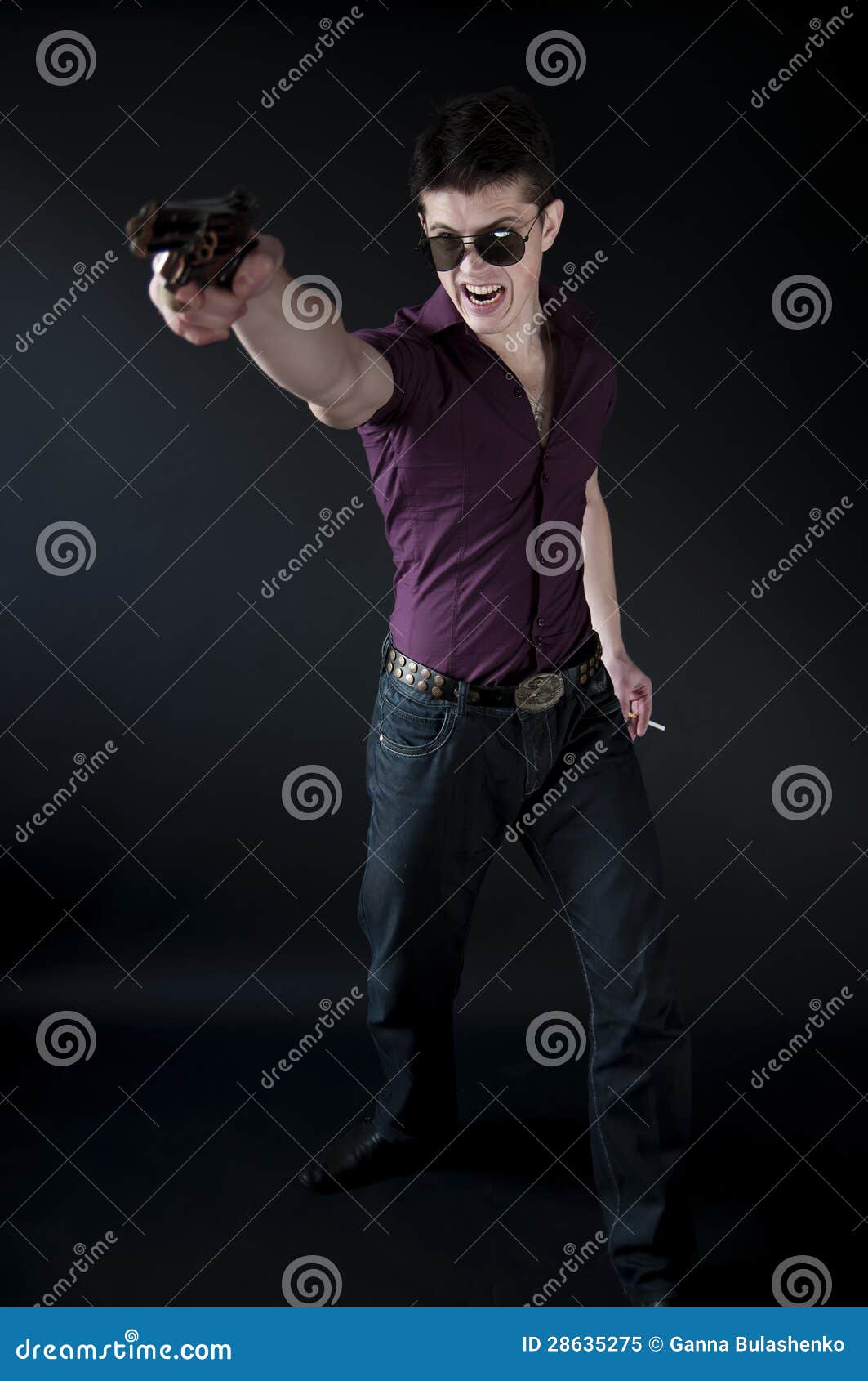 Handsome man with a gun stock image. Image of effect - 28635275