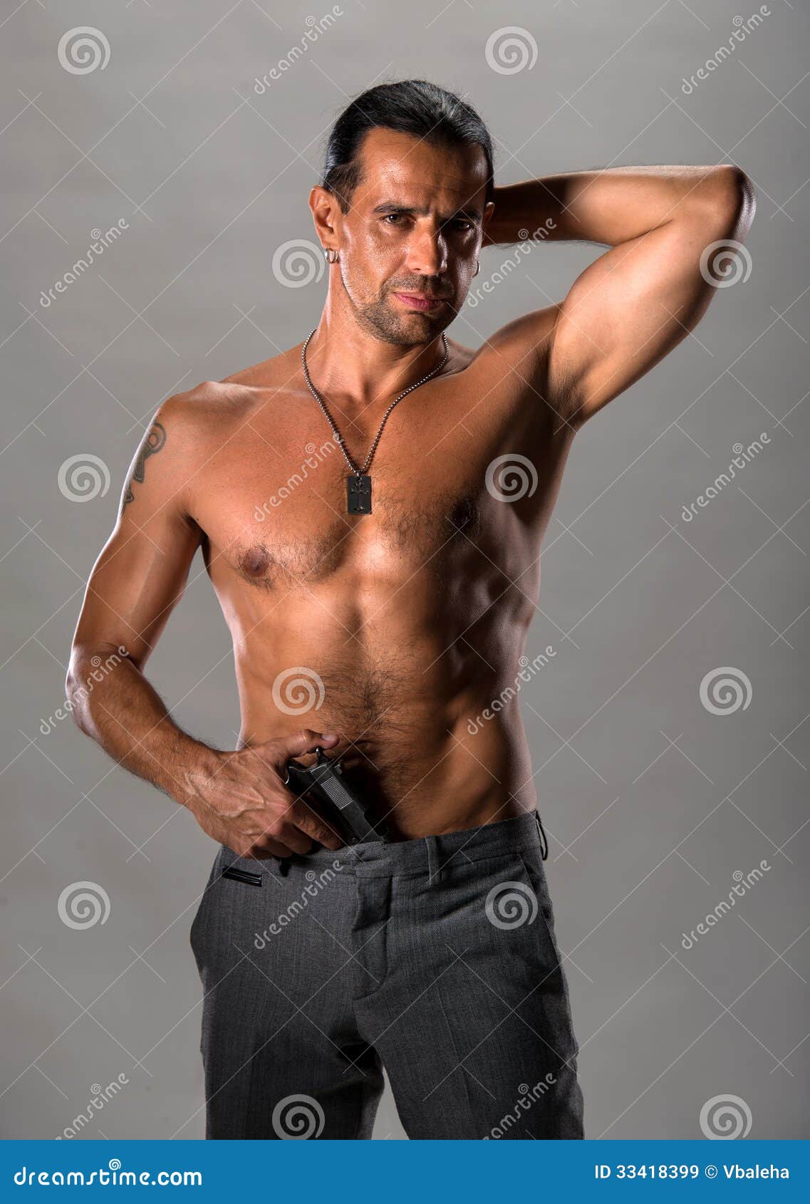 Handsome man with a gun stock image. Image of inspector - 33418399