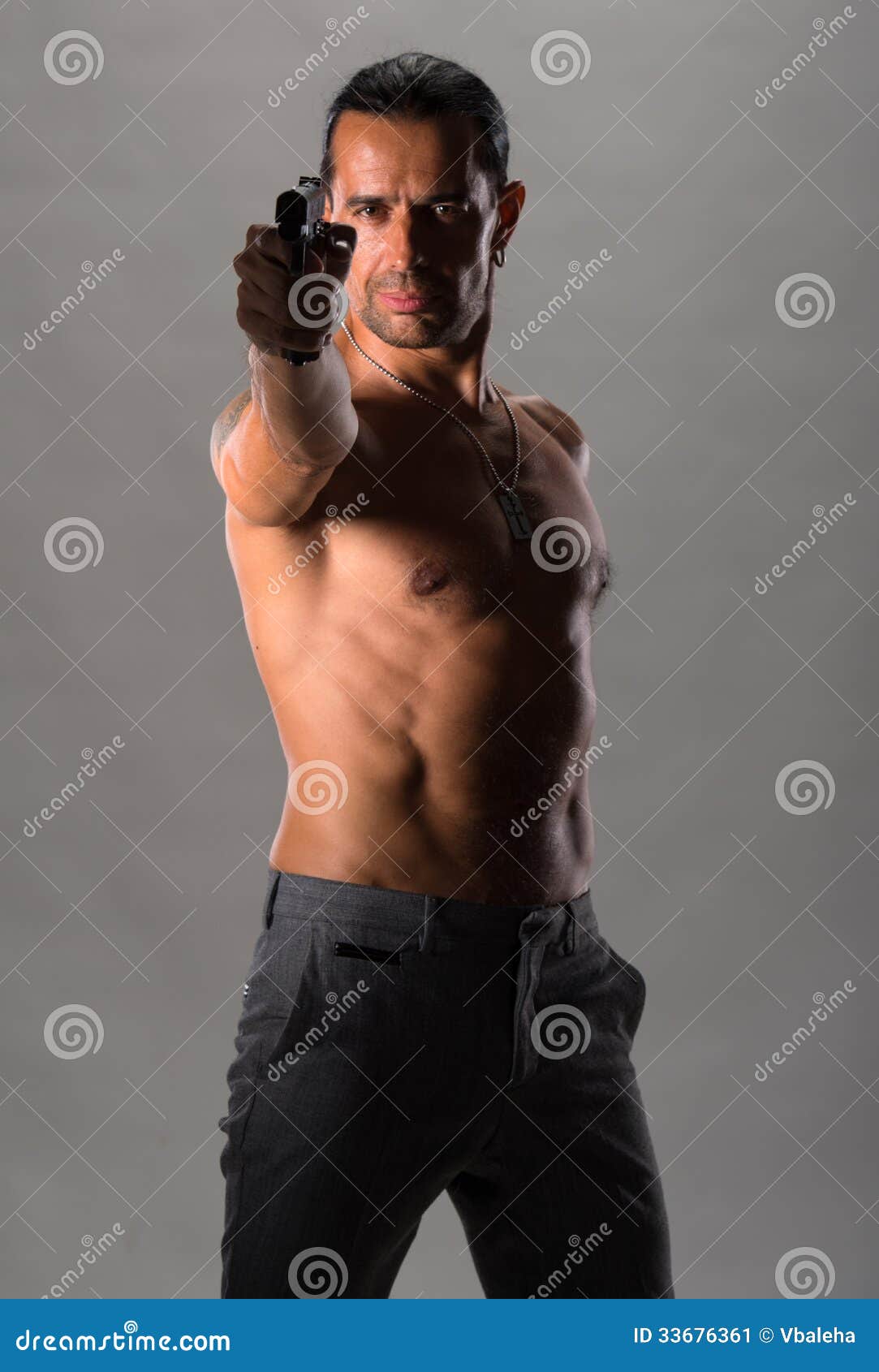Handsome man with a gun stock image. Image of inspector - 33676361
