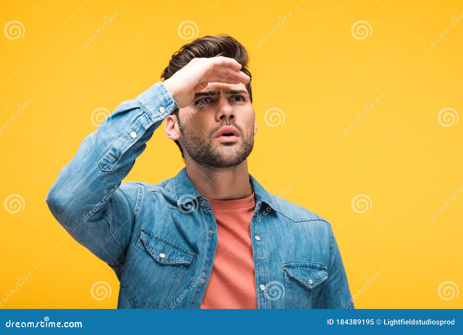 Handsome Man with Hand on Forehead Isolated on Yellow Stock Image ...