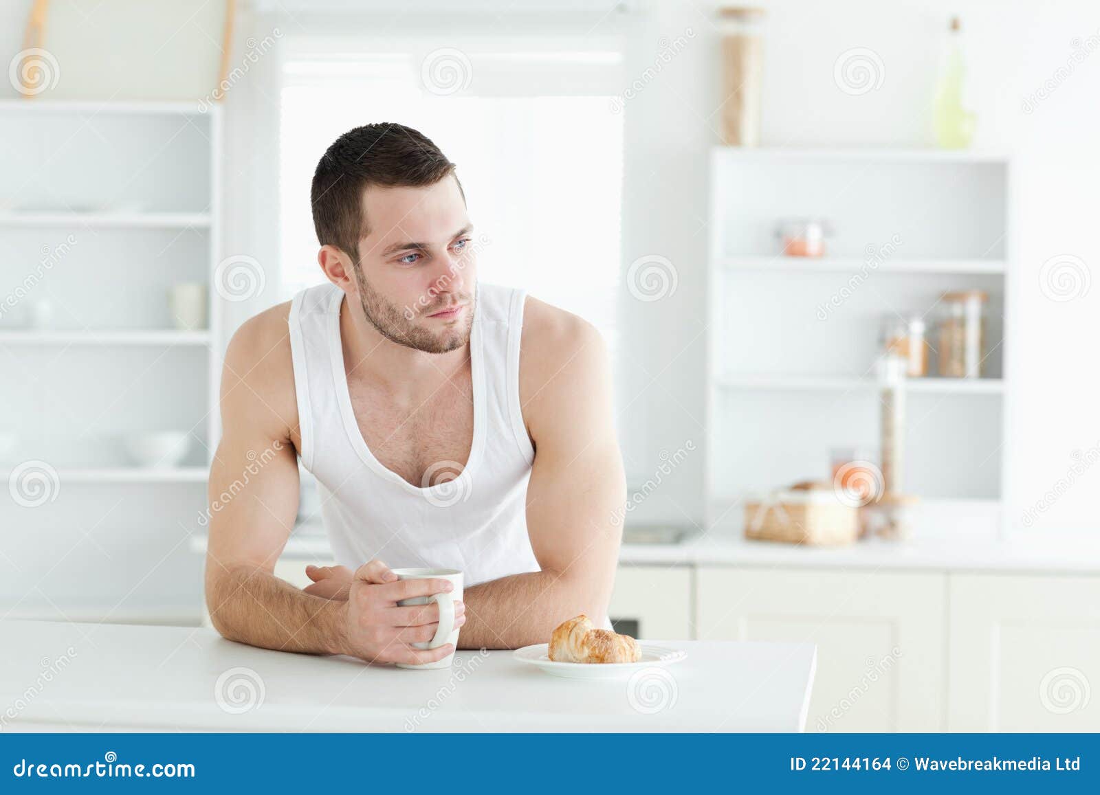 Handsome Man Having Breakfast Stock Photo - Image of muscle, coffee ...