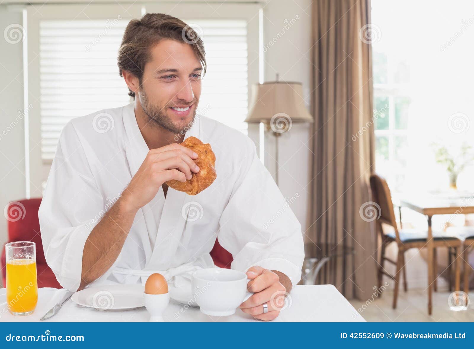 Handsome Man Having Breakfast in His Bathrobe Stock Image - Image of ...