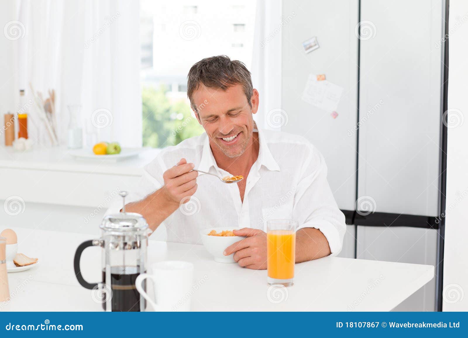 Handsome Man Having His Breakfast in the Kitchen Stock Image - Image of ...