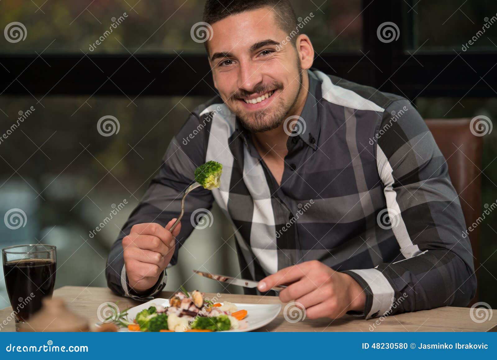 Handsome Man Having Lunch in a Restaurant Stock Photo - Image of ...