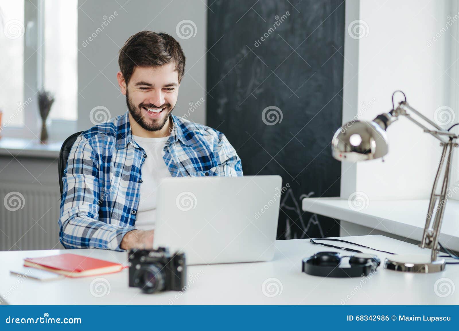 Handsome Man Having a Video Conversation on Laptop Stock Photo - Image ...