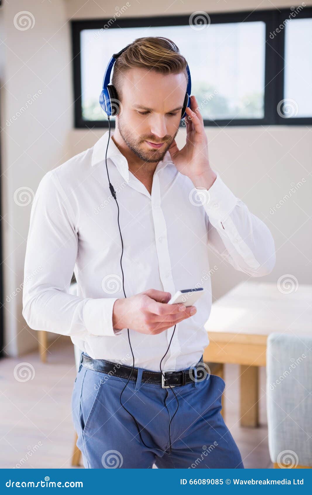 Handsome Man with Headphones Stock Image - Image of life, indoors: 66089085