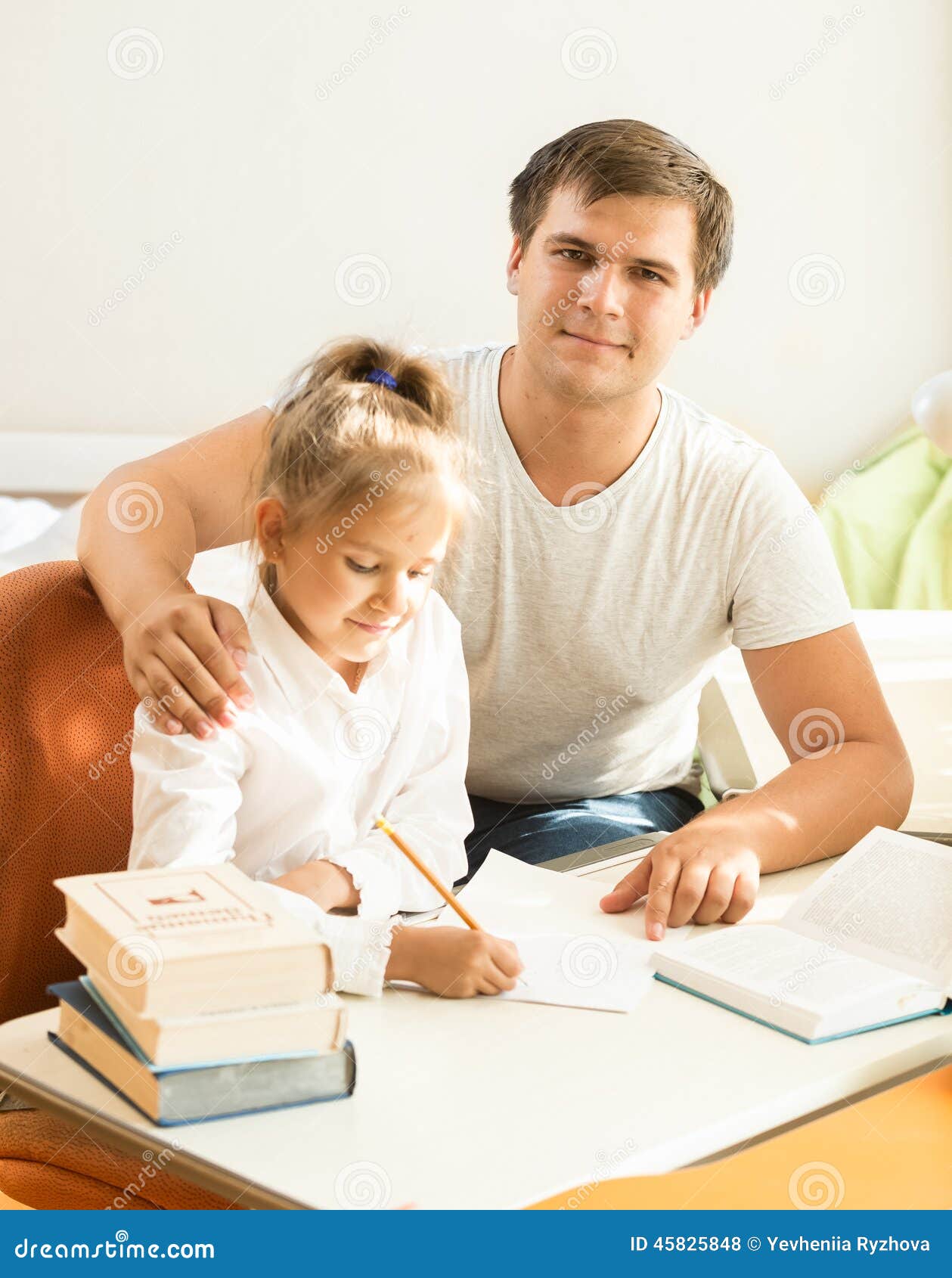 Handsome Man Helping Daughter with Homework Stock Photo - Image of ...