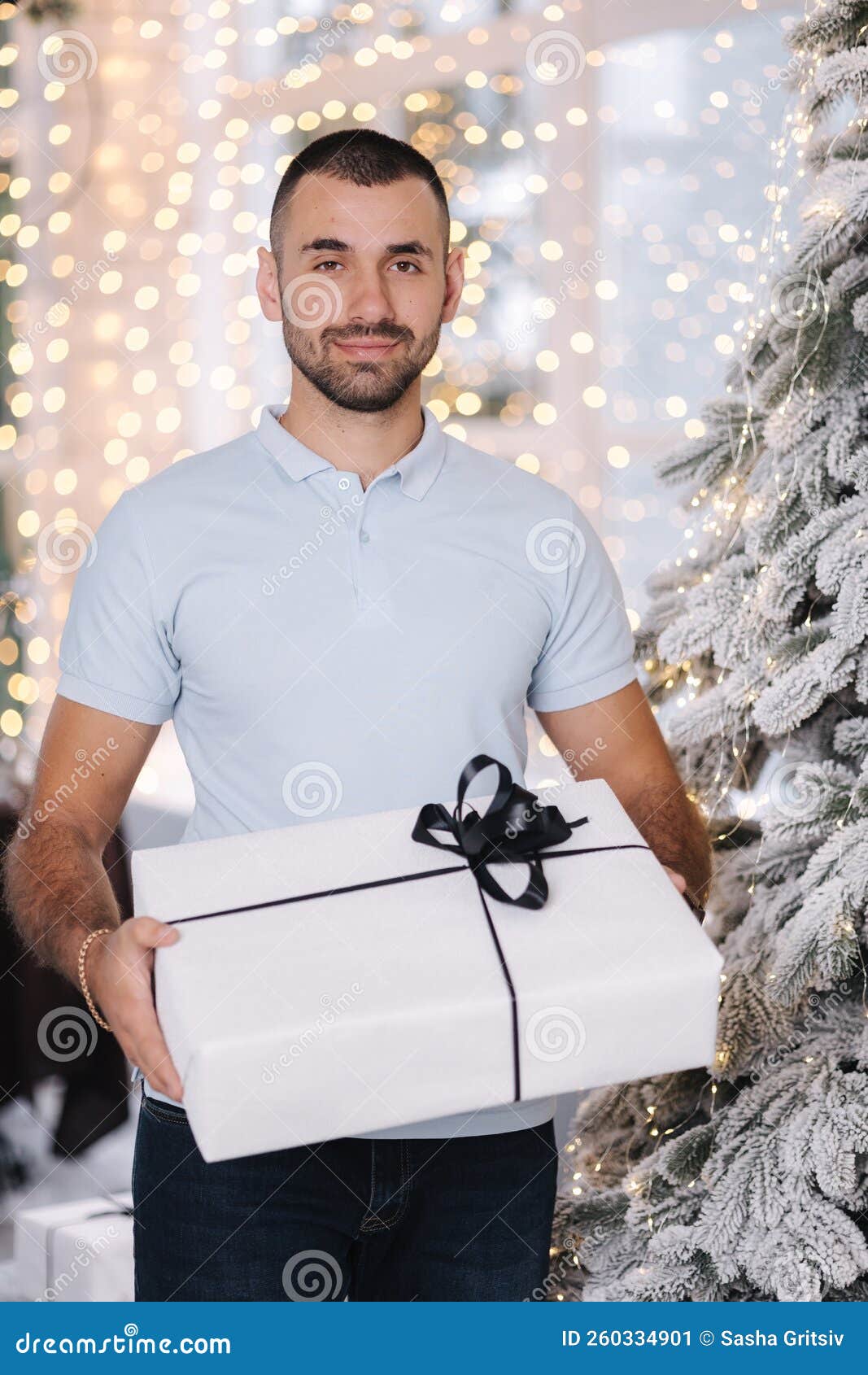 Handsome Man Hold Big Present in Hands. Christmas Mood Stock Image ...