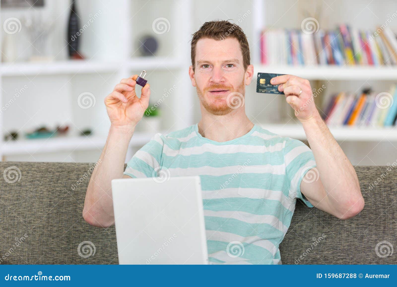 Handsome Man Holding Credit Card and Using Laptop Stock Photo - Image ... Handsome Man Holding Credit Card and Using Laptop Stock Photo - Image ...