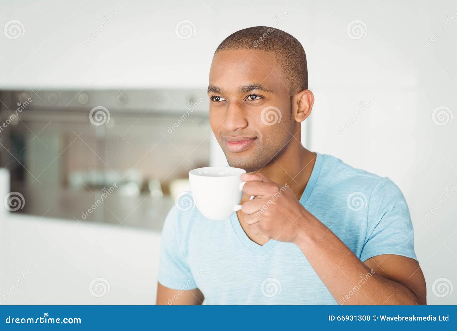 Handsome man holding cup stock photo. Image of happy - 66931300