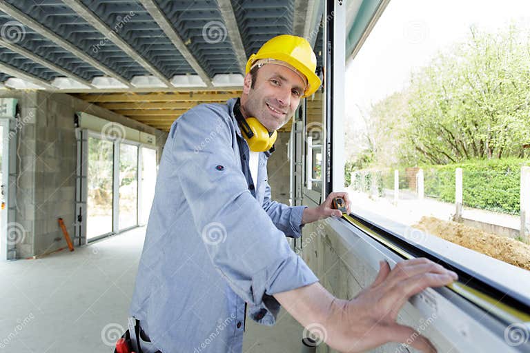 Handsome Man Installing Bay Window in Construction Site Stock Image ...
