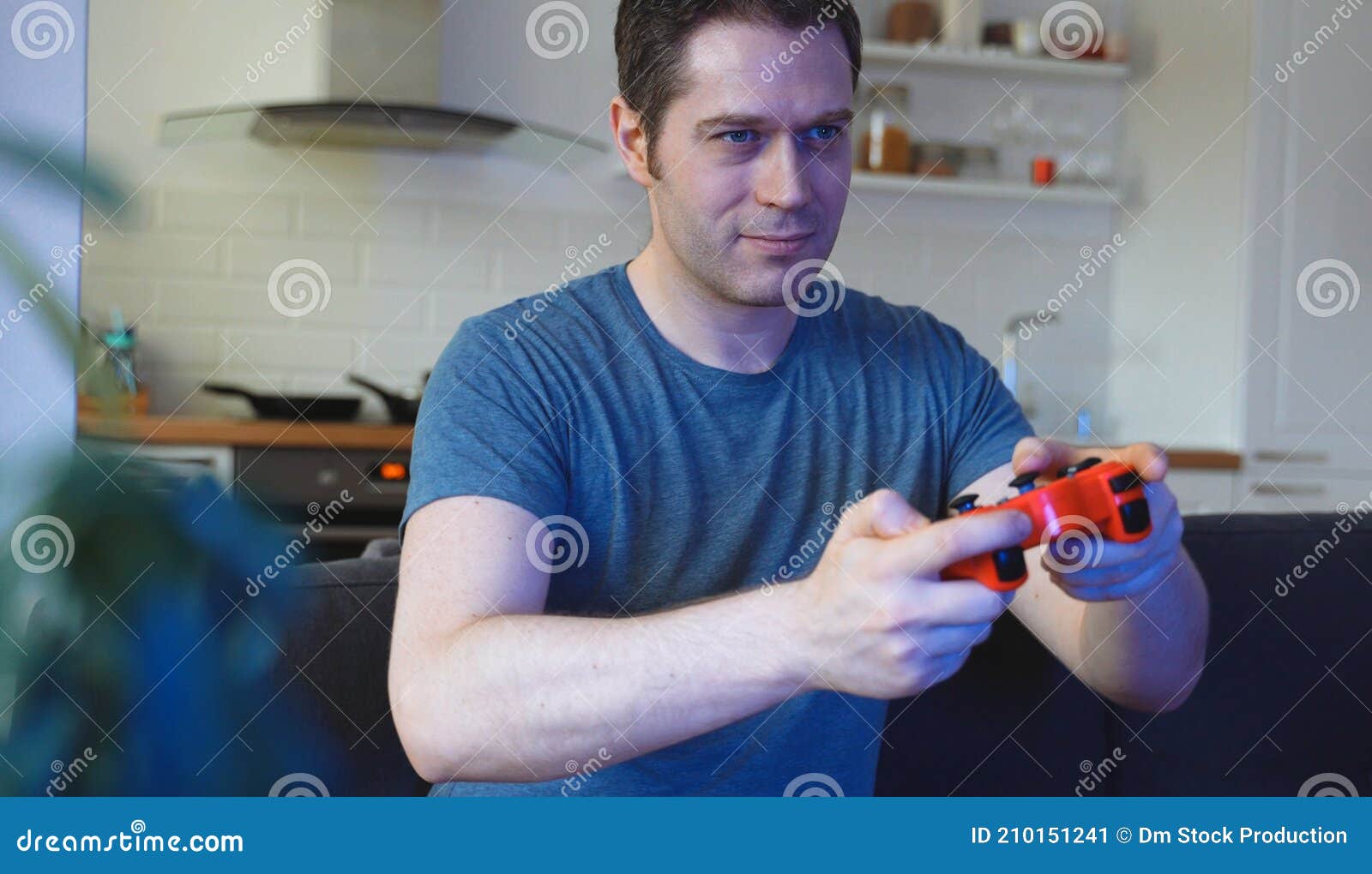 Handsome man with joystick stock image. Image of patrol - 210151241