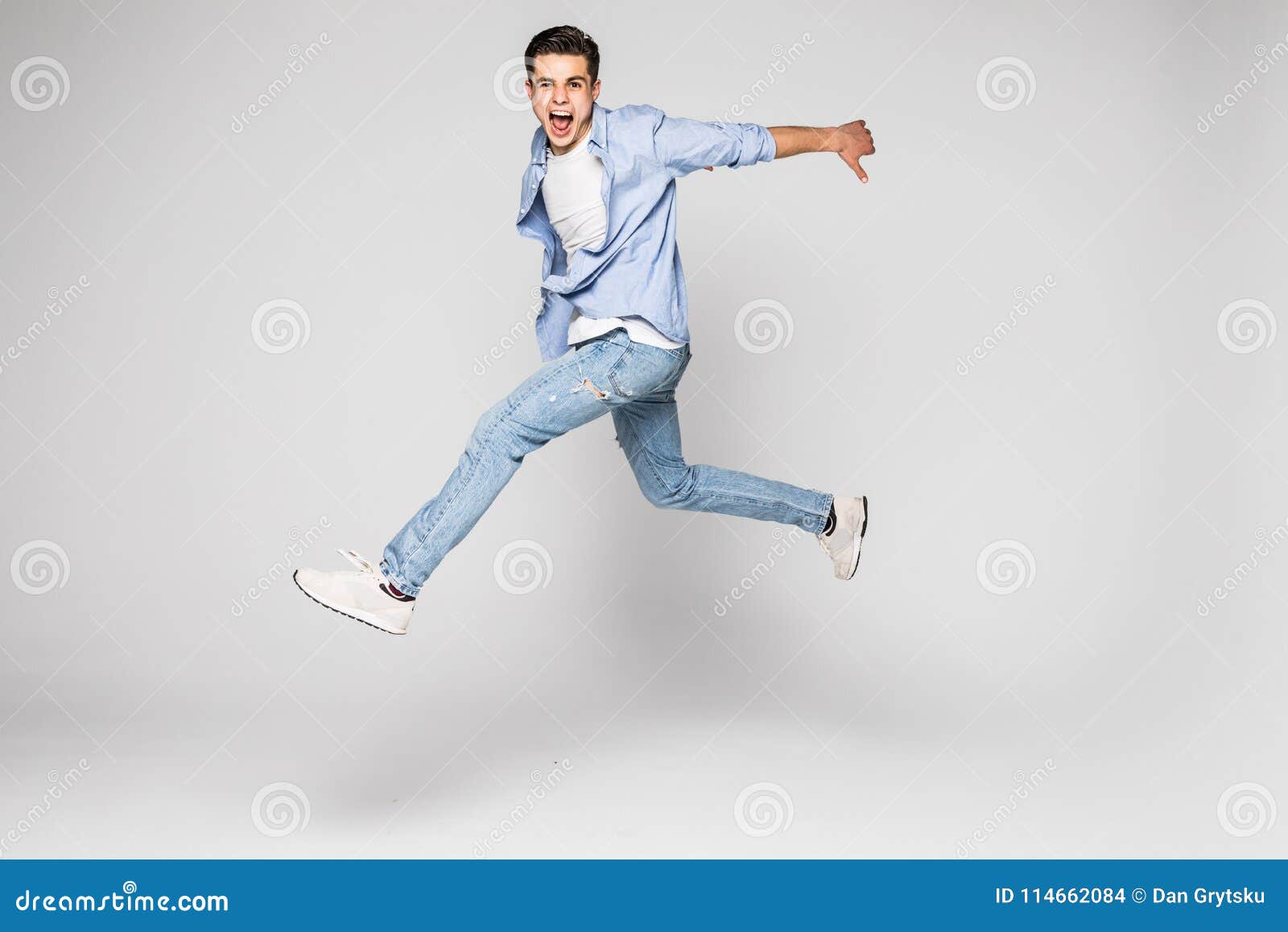 Handsome Young Man Jumping Isolated on White Background Stock Photo ...