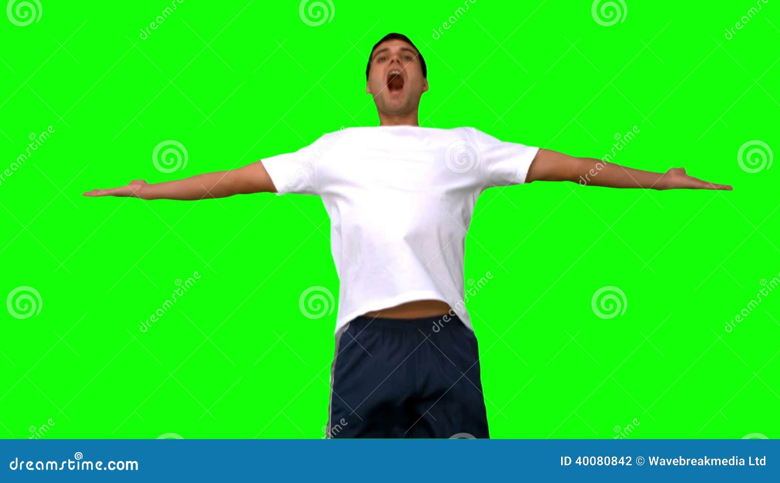 Handsome Man Jumping and Raising Arms on Green Screen Stock Footage ...