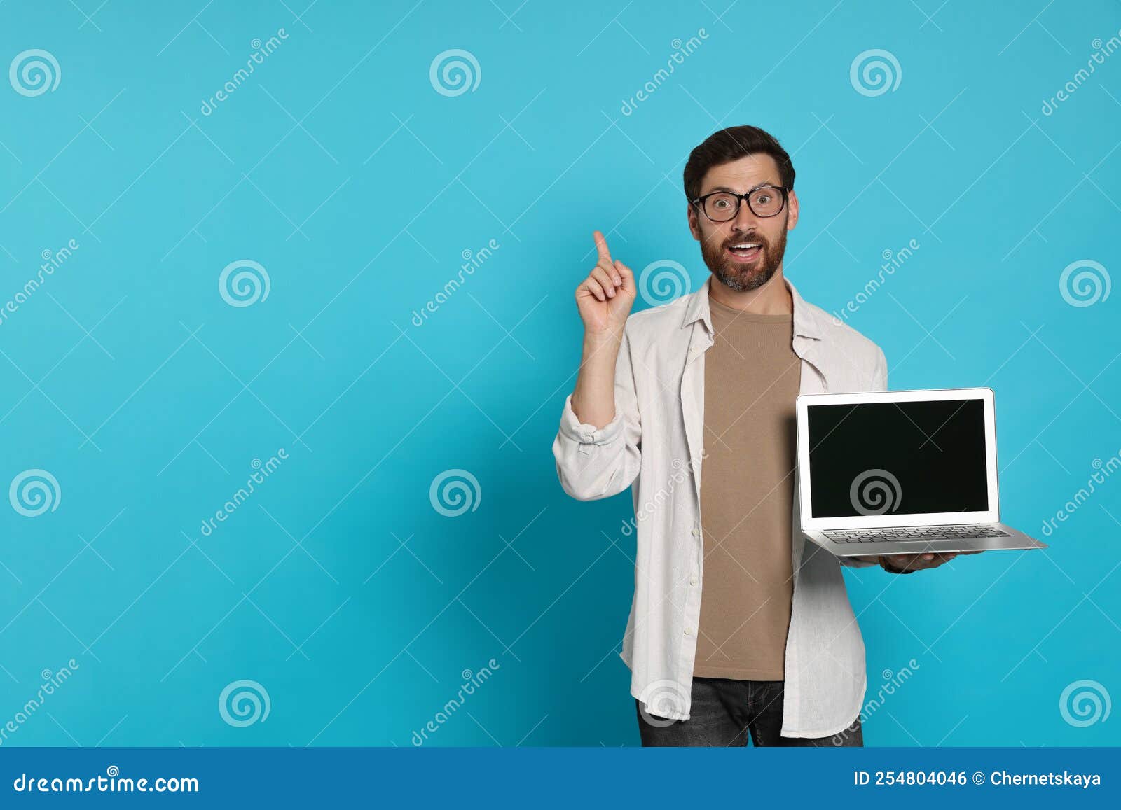 Handsome Man with Laptop on Blue Background Stock Photo - Image of ...