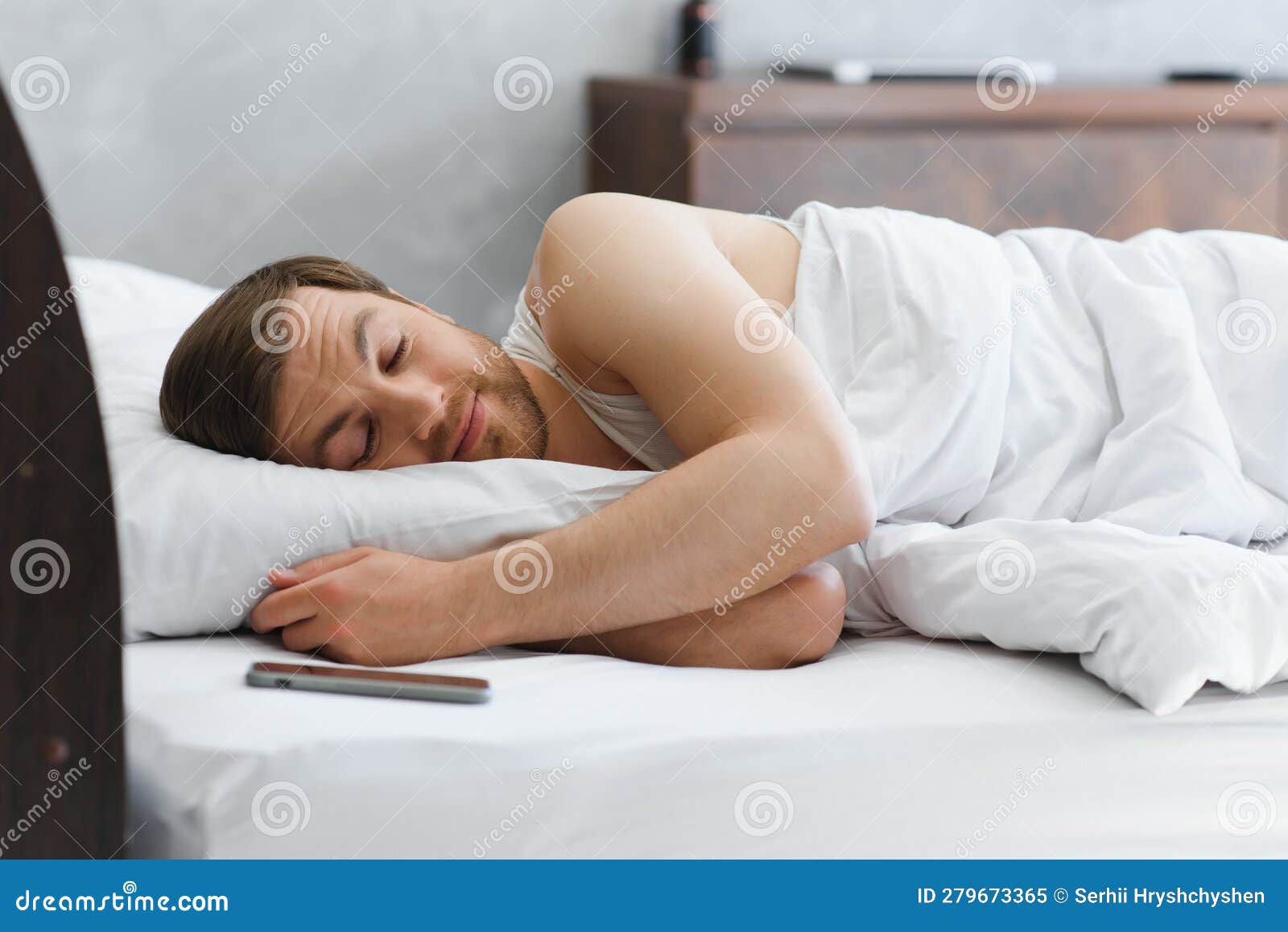 Handsome Man Laughing Lying on His Bed at Home Stock Image - Image of ...