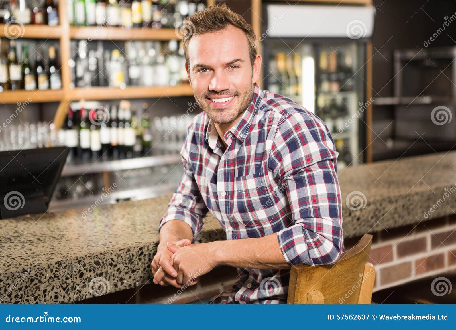 Handsome Man Leaning on Counter Stock Image - Image of male, spare ...