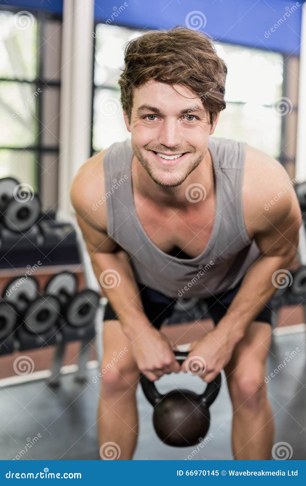 Handsome Man Lifting Dumbbells Stock Image - Image of healthy, athletic ...