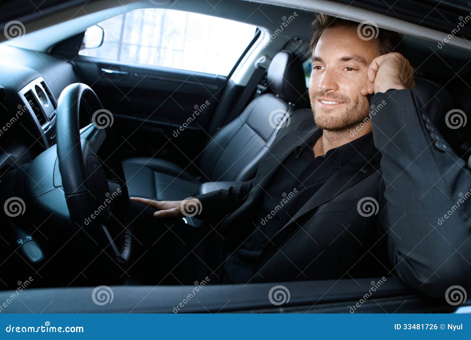 Handsome man in limousine stock photo. Image of cellular - 33481726