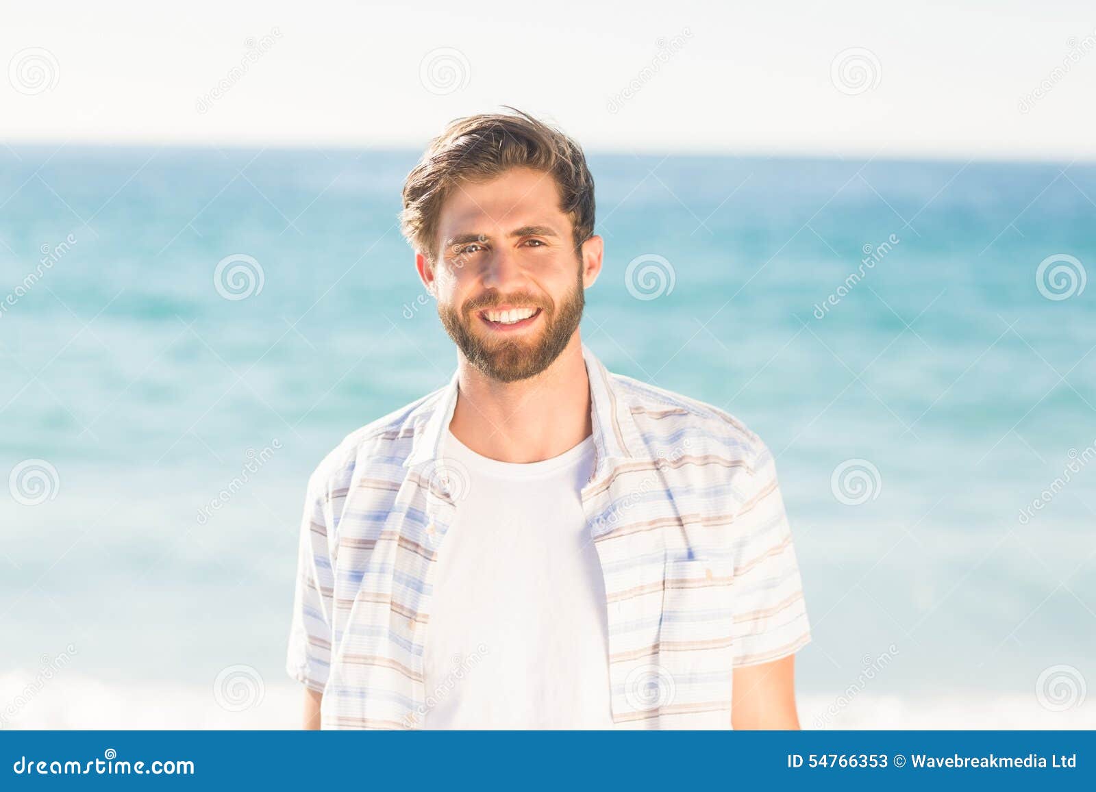 Handsome Man Looking at Camera Stock Image - Image of bright, outdoors ...