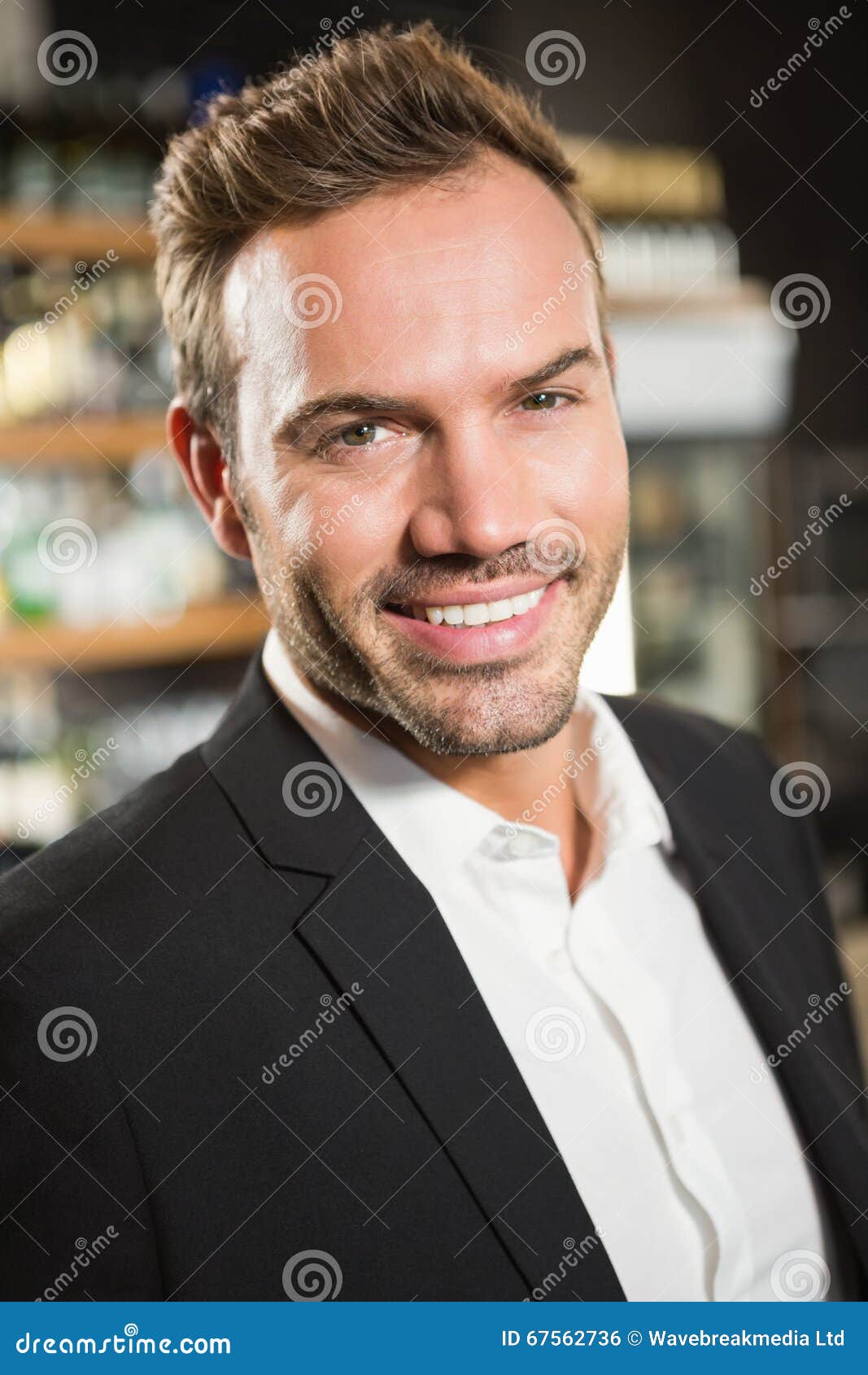 Handsome Man Looking at Camera Stock Photo - Image of portrait, sitting ...