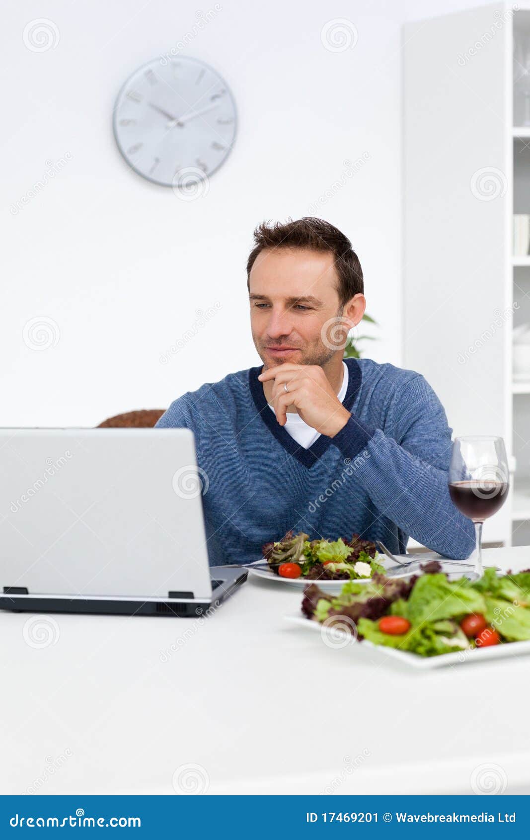 Handsome Man Looking at His Laptop Stock Image - Image of enjoyment ...