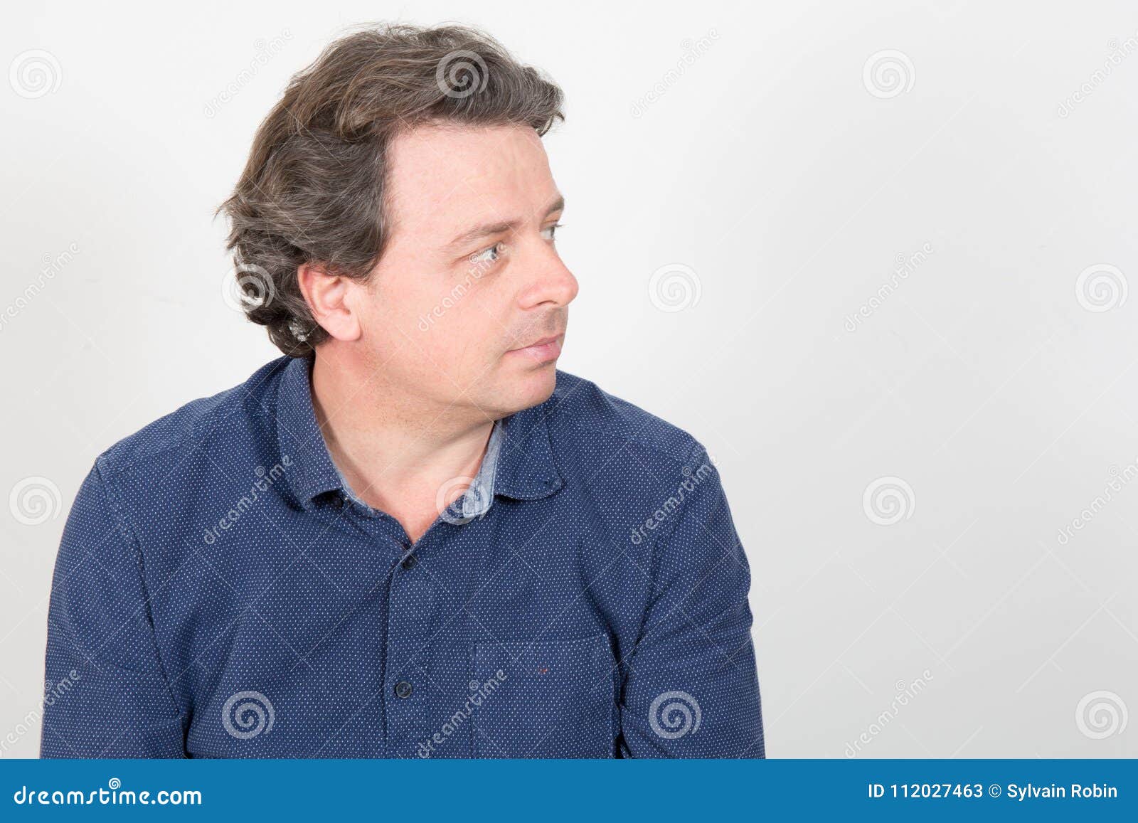 A Handsome Man Looking Sideways Stock Image - Image of people, adult ...