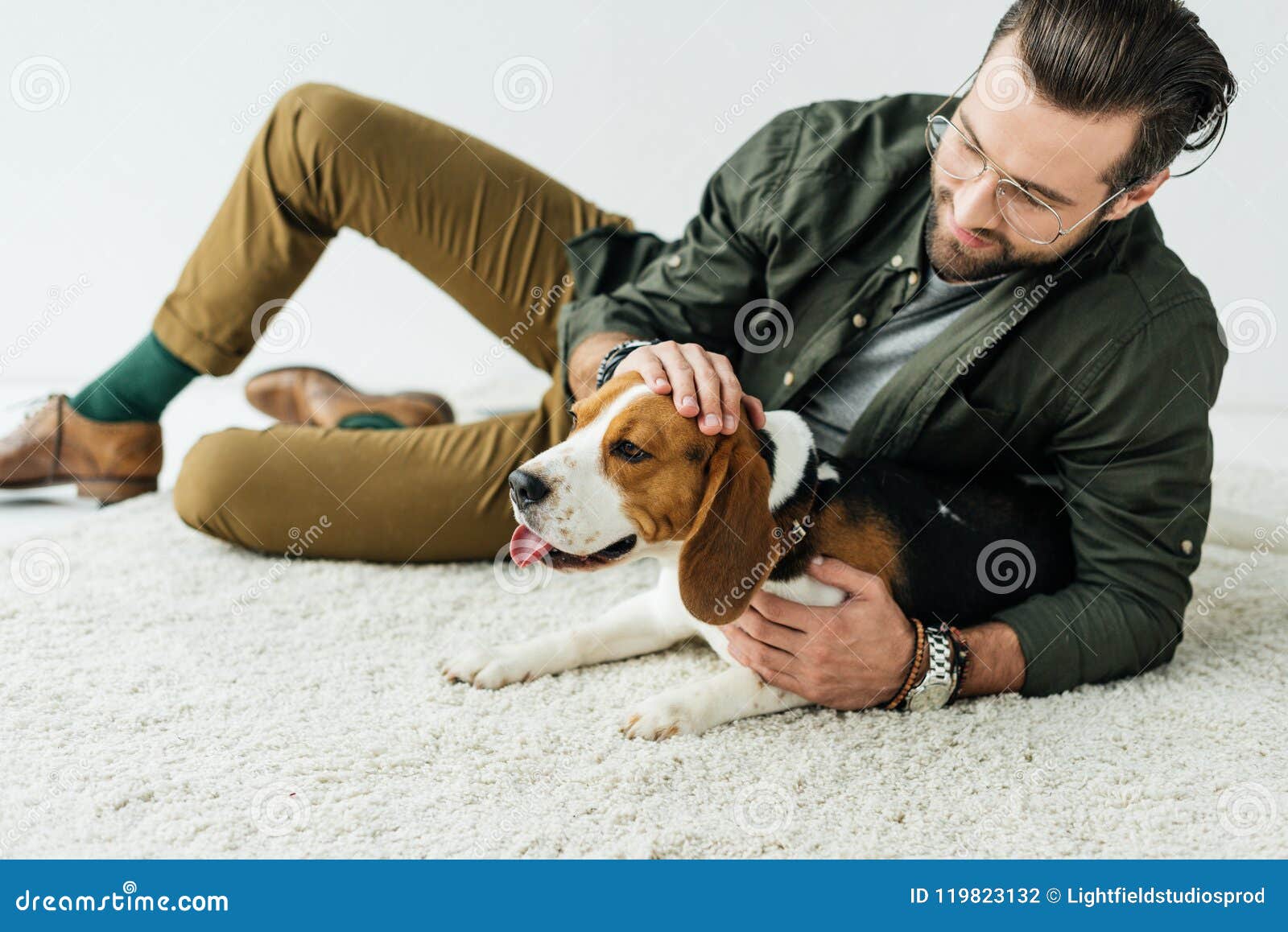 Handsome Man Lying on Carpet and Palming Stock Photo - Image of happy ... Handsome Man Lying on Carpet and Palming Stock Photo - Image of happy ...