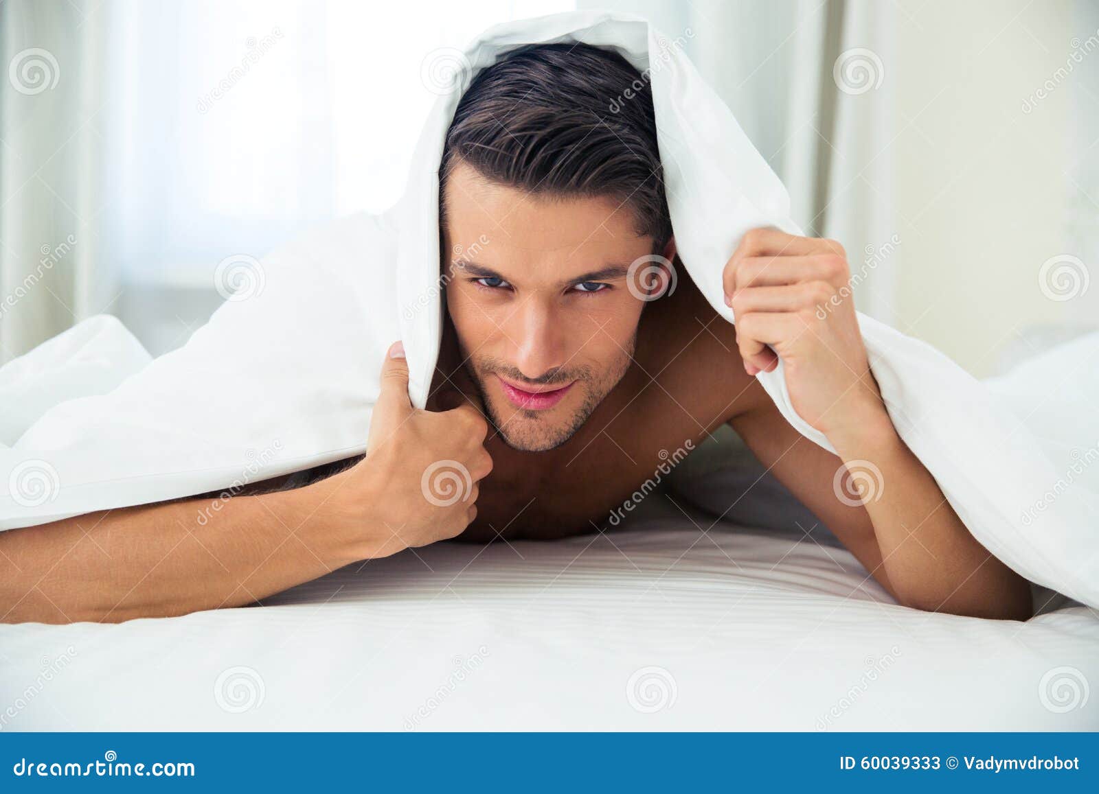 Handsome Man Lying Under Blanket in the Bed Stock Image - Image of ... Handsome Man Lying Under Blanket in the Bed Stock Image - Image of ...